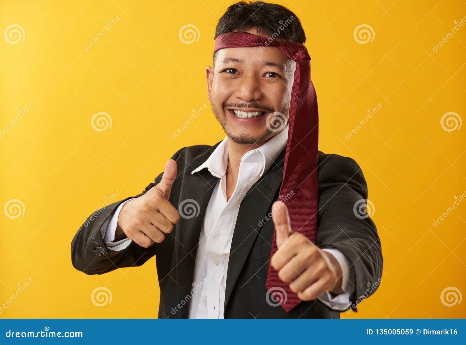 Drunk Asian Man With Laptop And Alarm Clock Lying Down On The Bed And ...