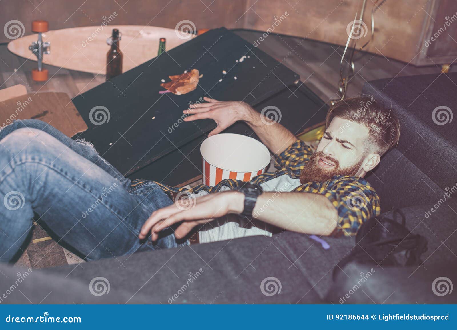 Drunk Bearded Man Lying on Floor in Messy Room Stock Photo - Image of ...