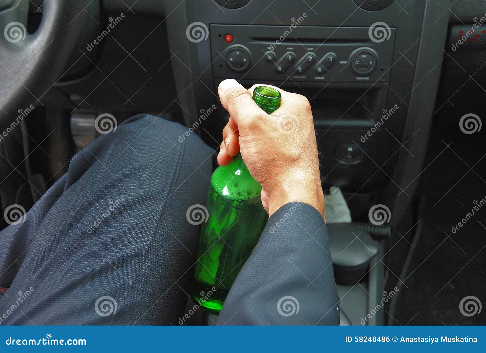 Drunk driver with bottle stock photo. Image of drive - 58240486