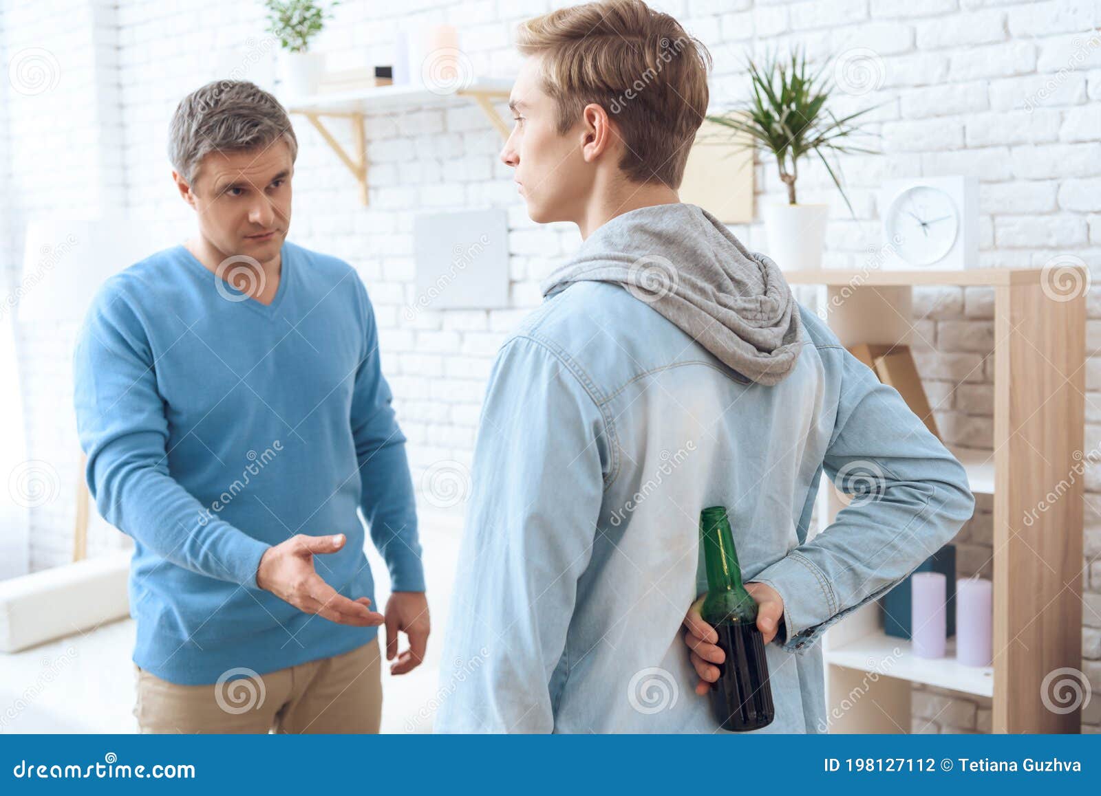 The Son Hid Alcohol from Dad. Stock Photo - Image of modern, misbehave ...