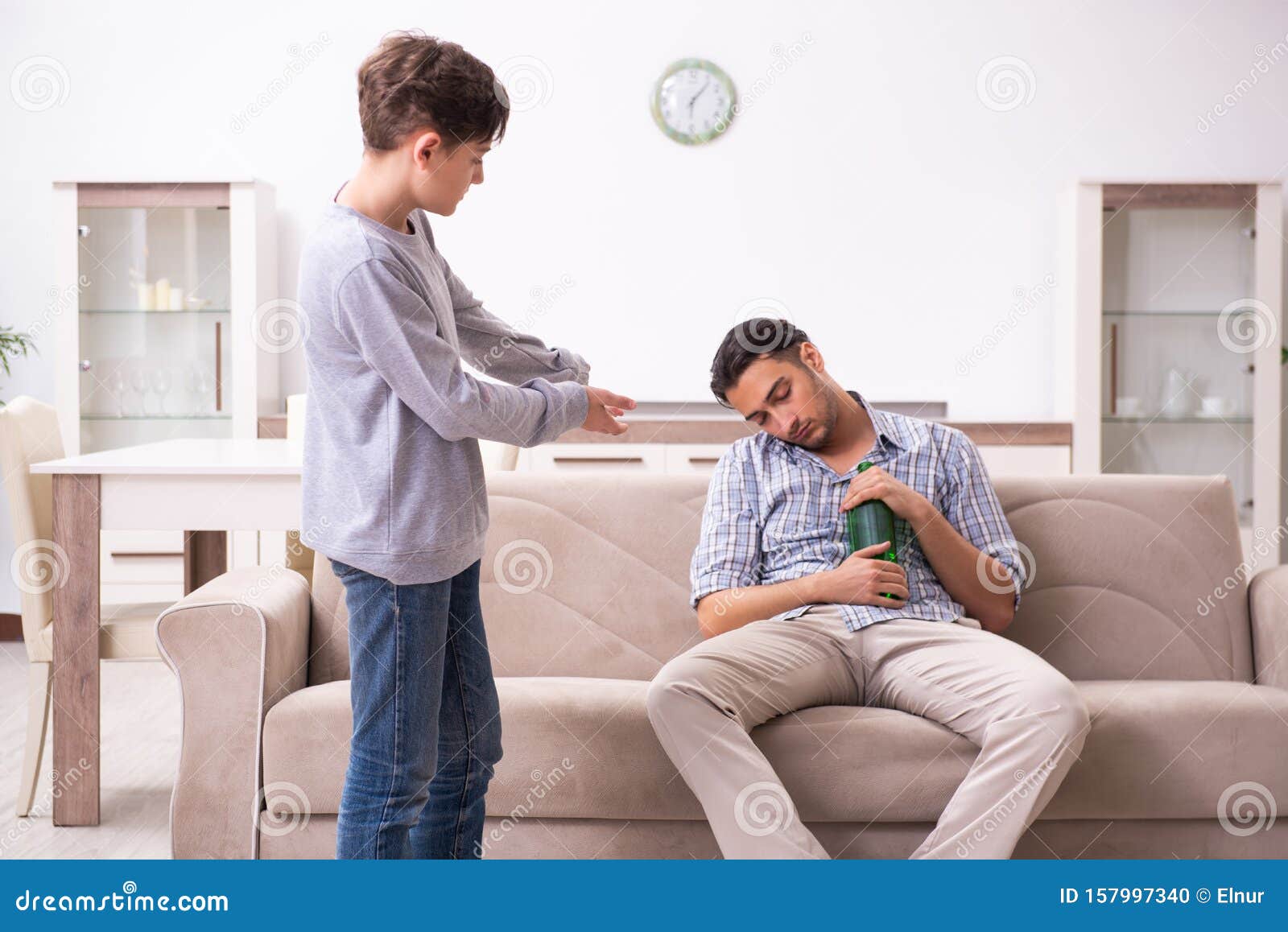 Drunk father and his son stock photo. Image of frustrated - 157997340