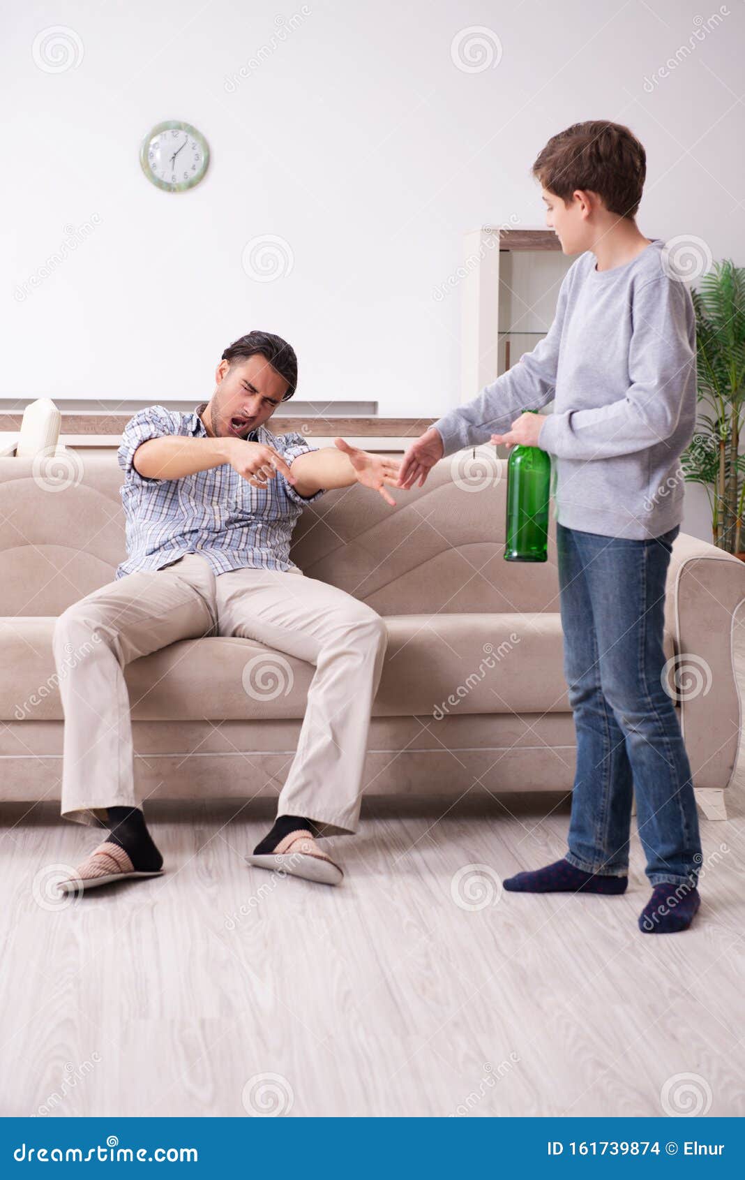 Drunk father and his son stock photo. Image of anger - 161739874