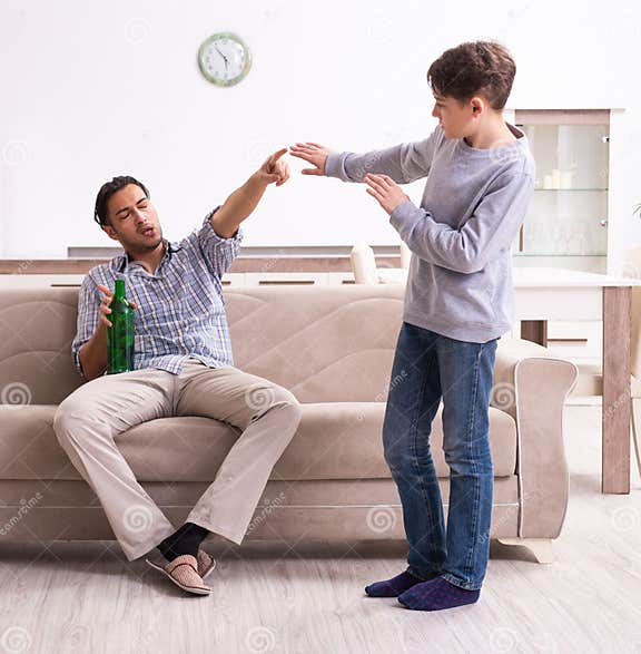 Drunk father and his son stock photo. Image of drunken - 262596034