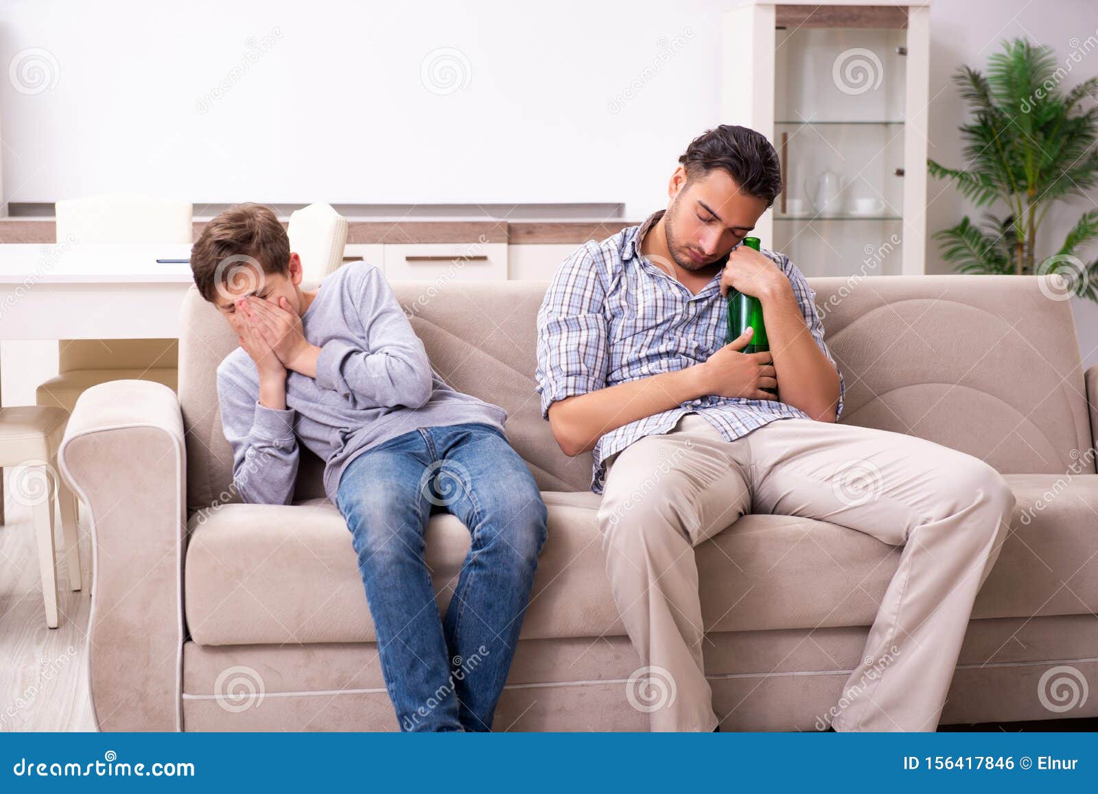 Drunk father and his son stock photo. Image of abuse - 156417846
