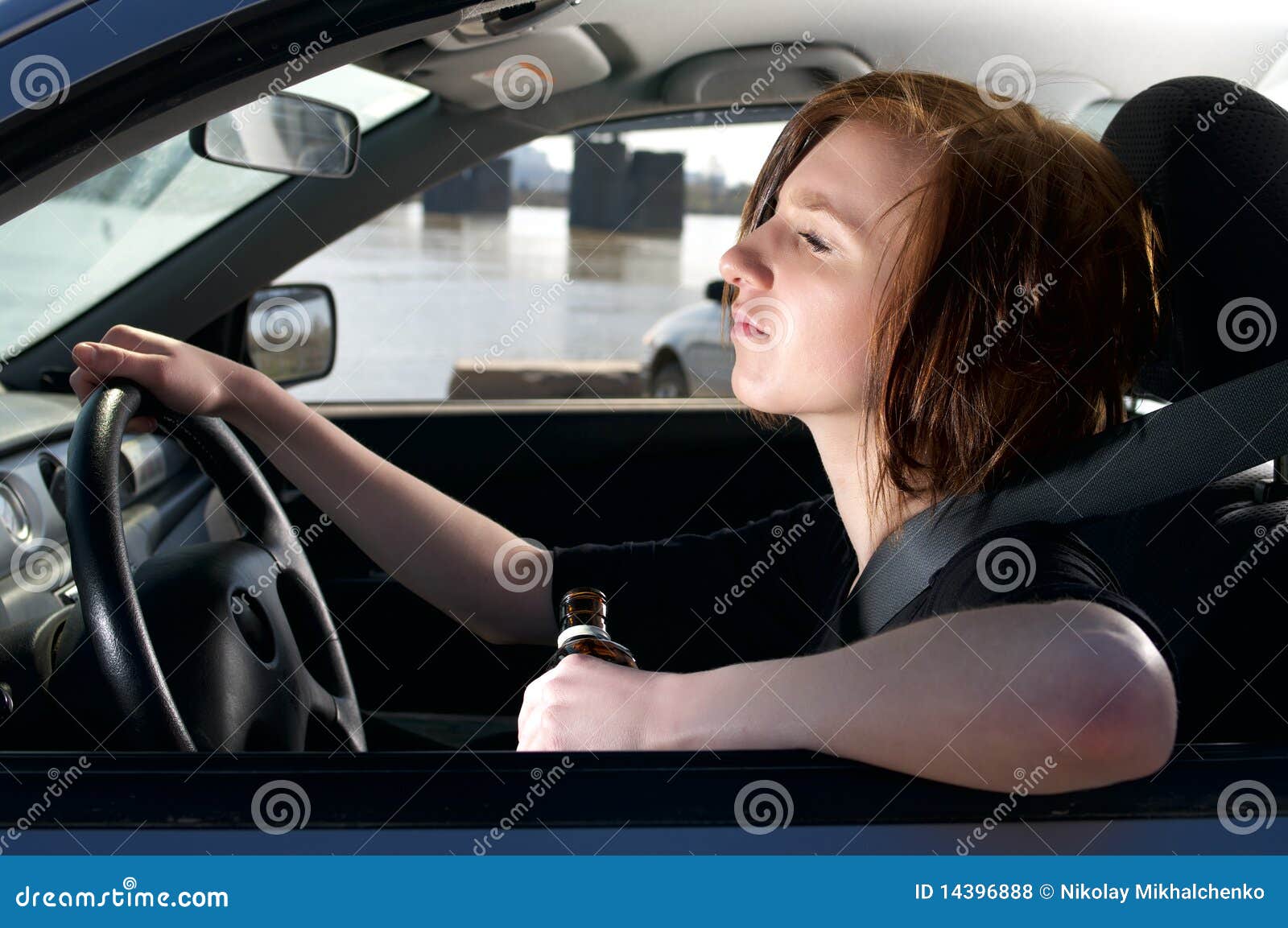 Drunk female driver stock photo. Image of lonely, drink - 14396888