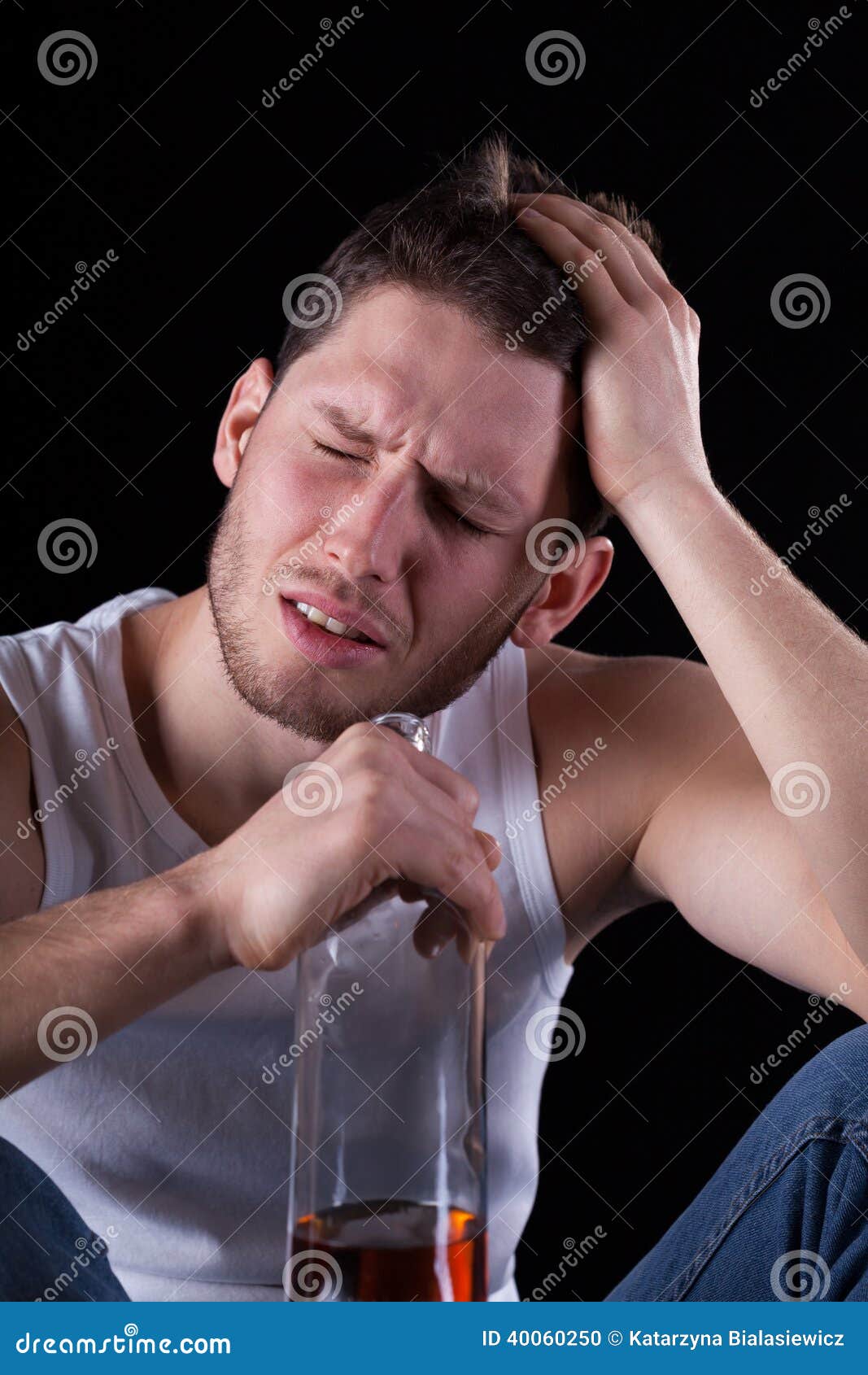 Drunk man with a bottle stock photo. Image of closeup - 40060250