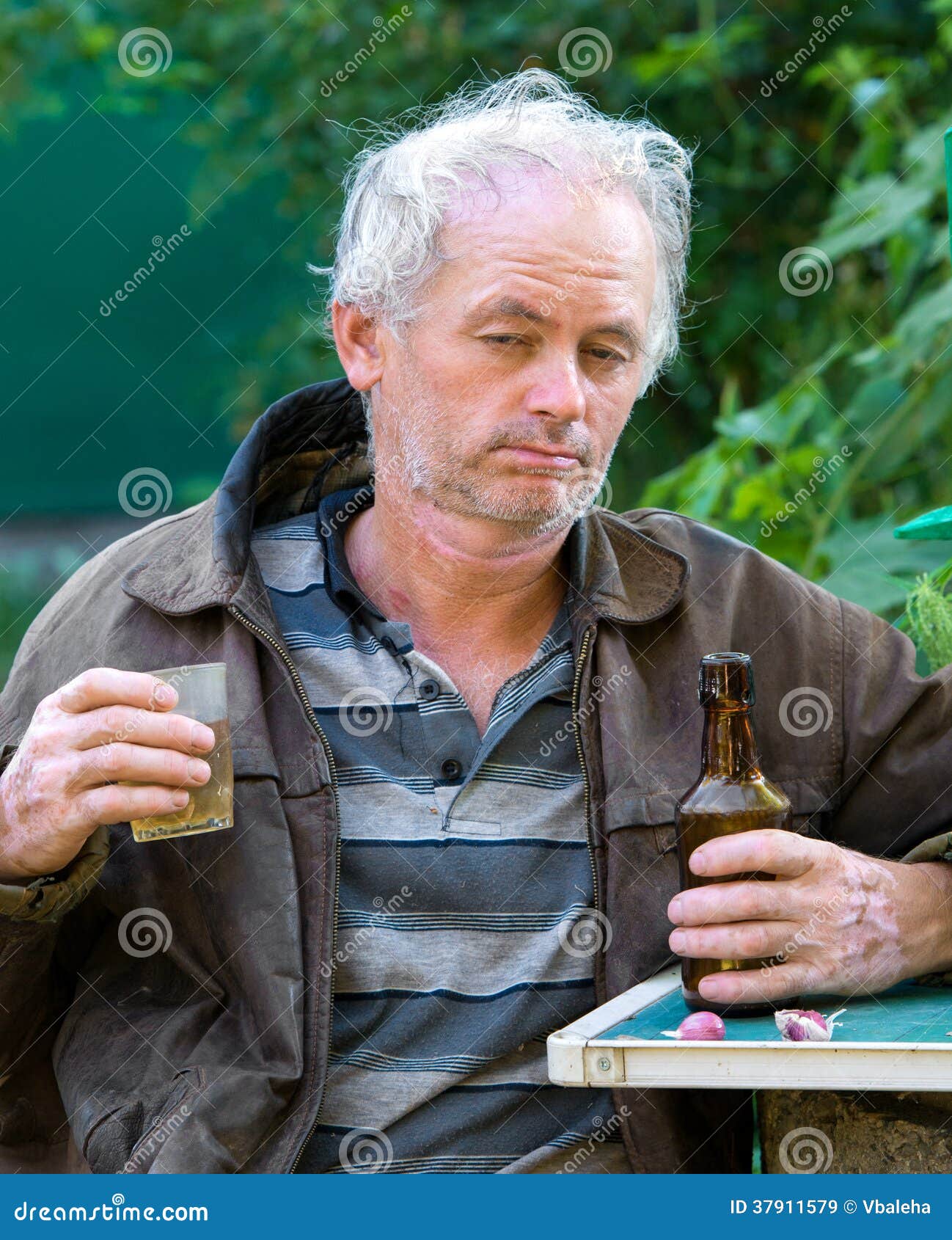 Drunk man drinking beer stock image. Image of male, alone - 37911579