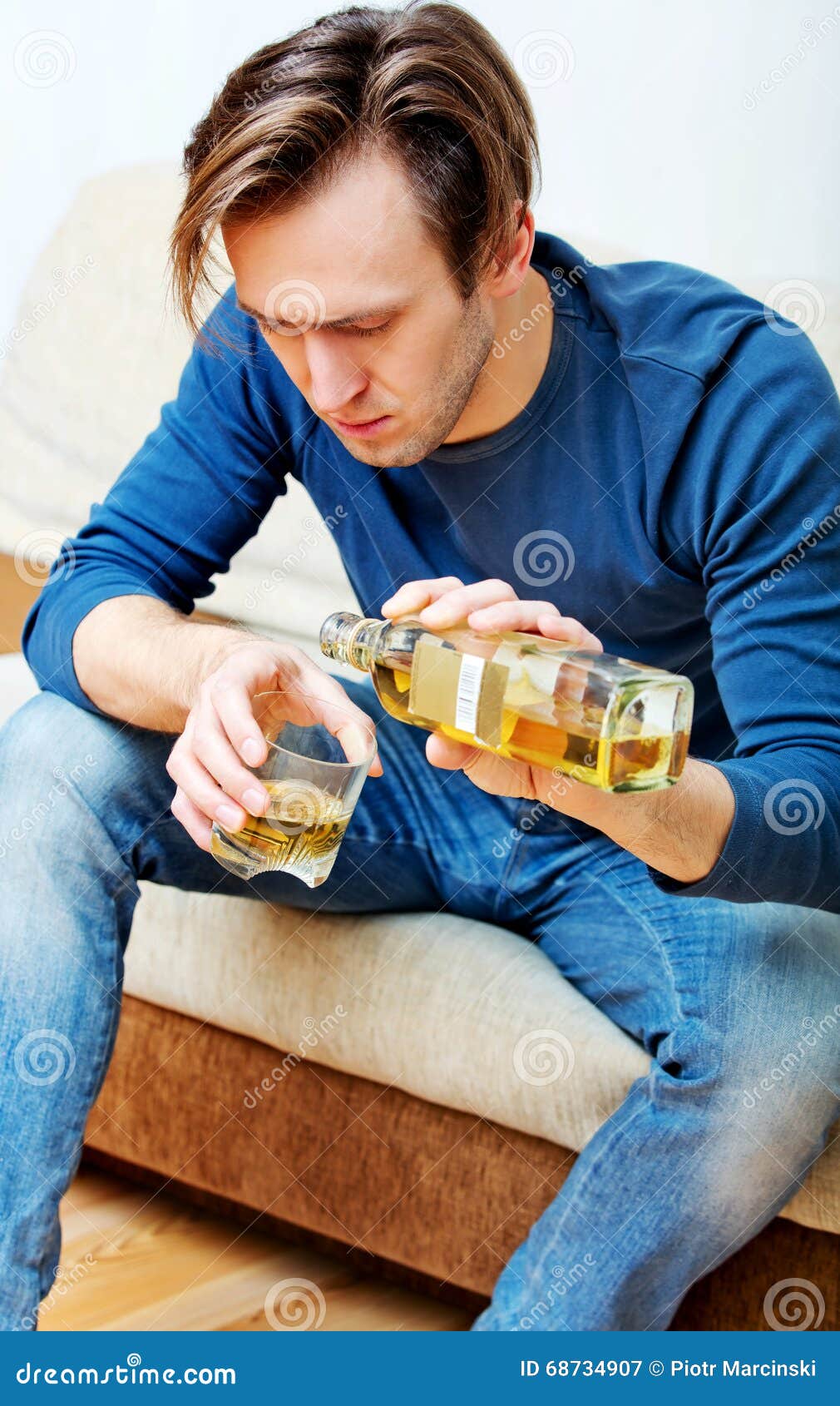 Drunk Man Sitting on Couch and Drinking Whiskey Stock Image - Image of ...