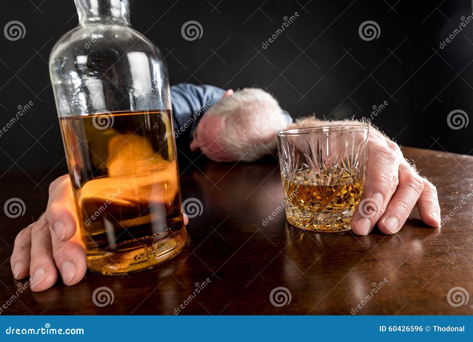 Drunk man slumped on table stock photo. Image of table - 60426596