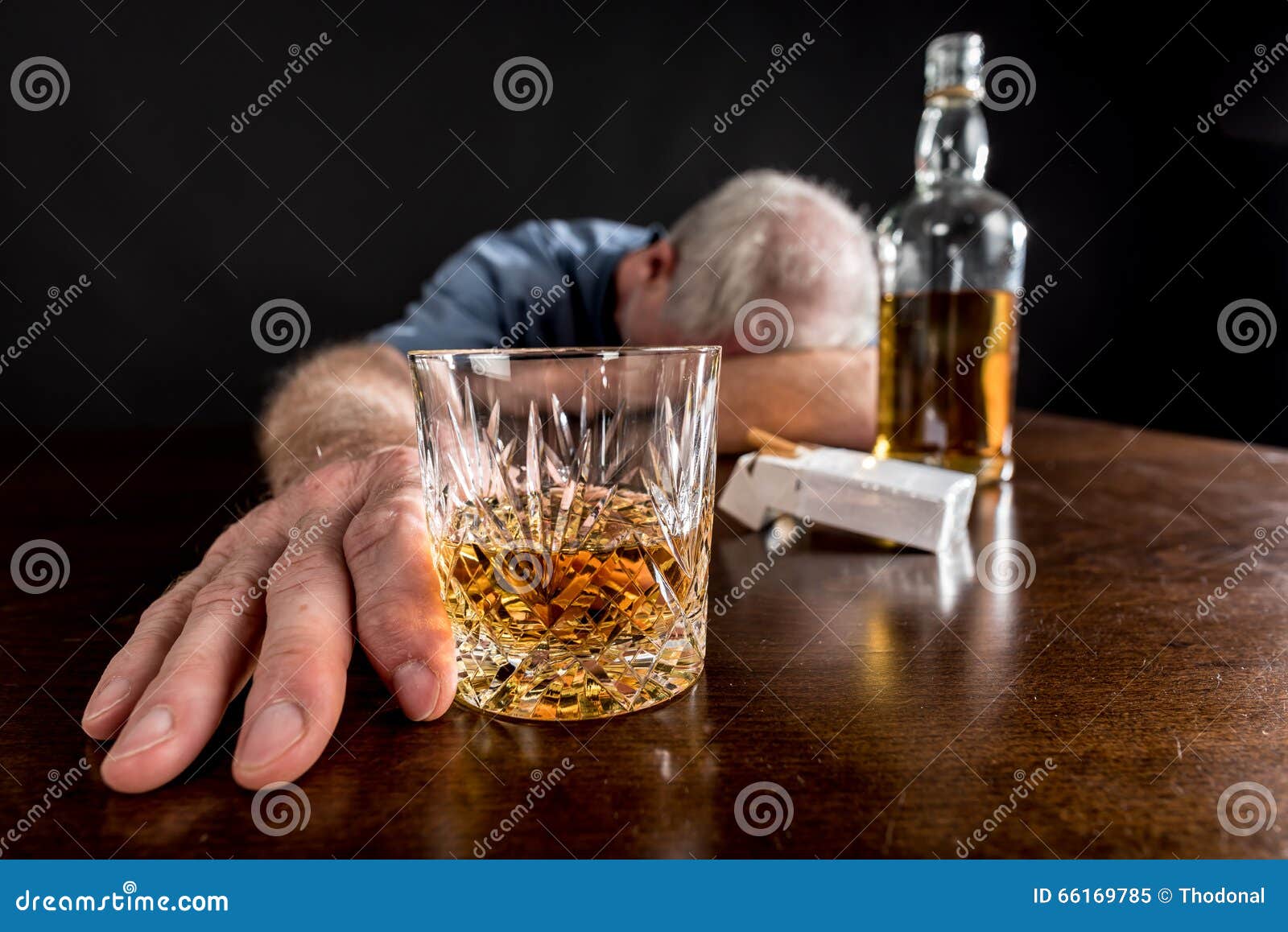 Drunk man slumped on table stock image. Image of alcohol - 66169785