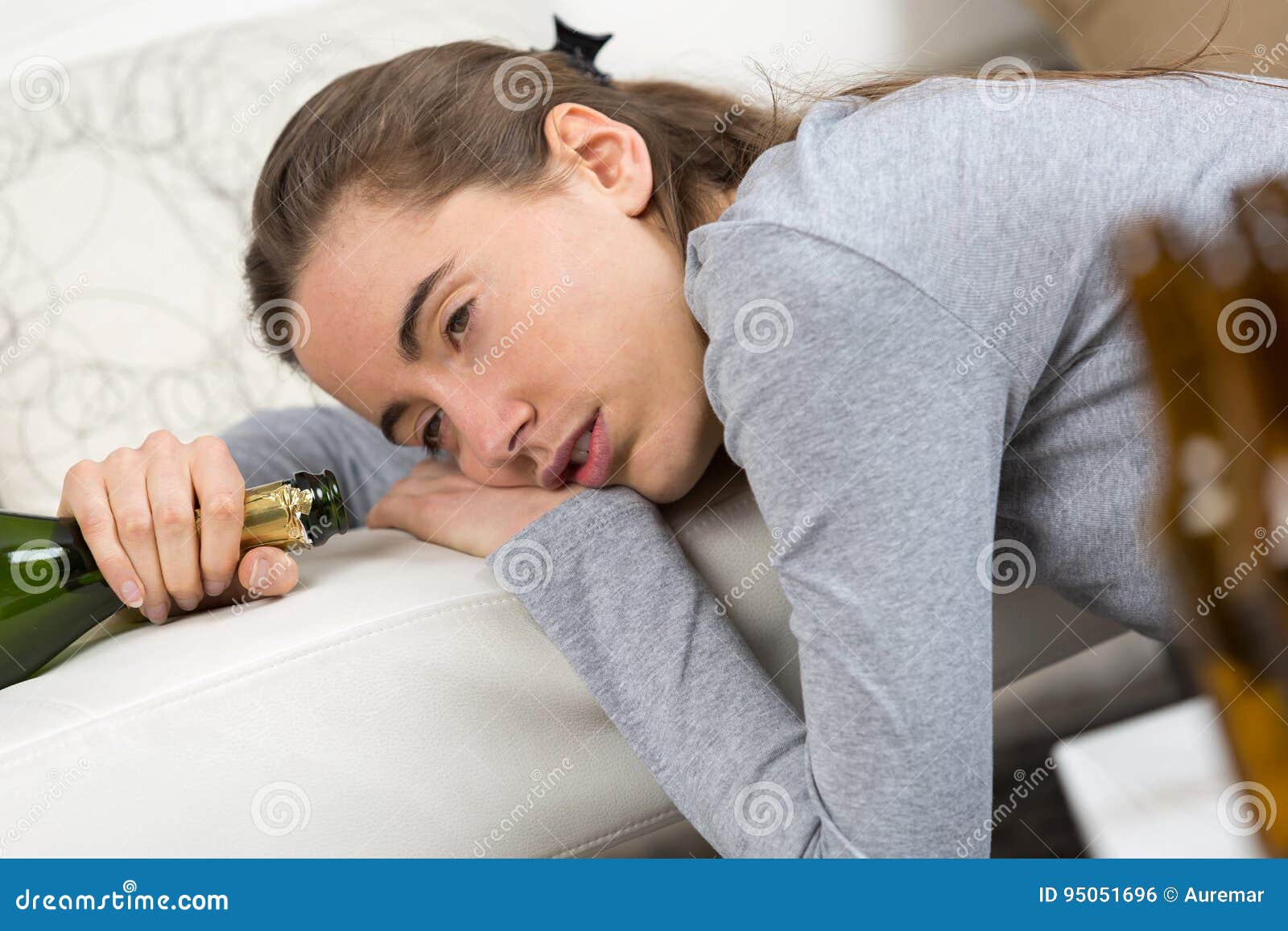 Drunk Woman on Table with Bottle in Hand Stock Photo - Image of alone ...