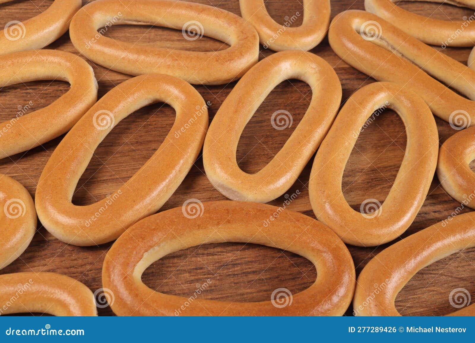 Dry Bagel Texture on a Wood Background Stock Photo - Image of bread ...
