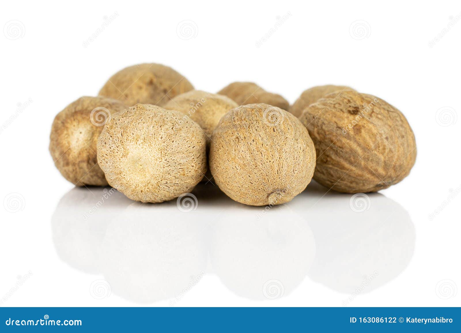 Dry Brown Nutmeg Isolated on White Stock Photo - Image of cooking ...