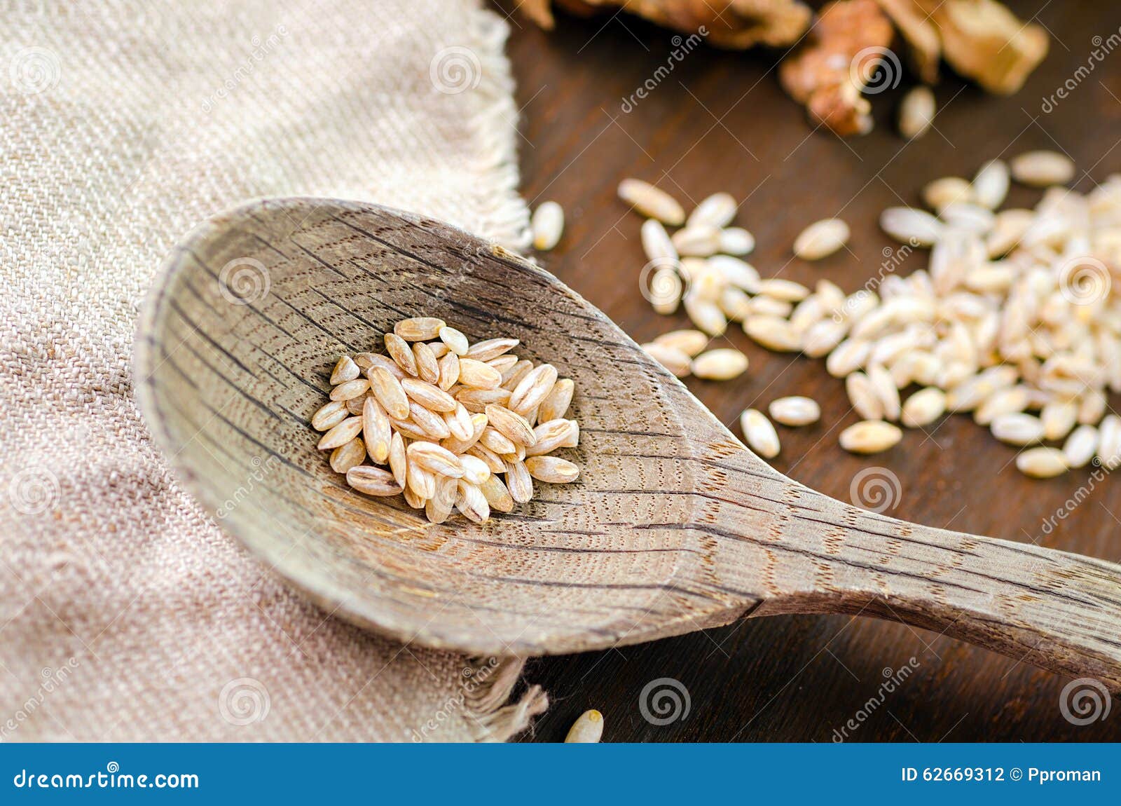 Dry brown rice stock photo. Image of boletus, diet, spoon - 62669312