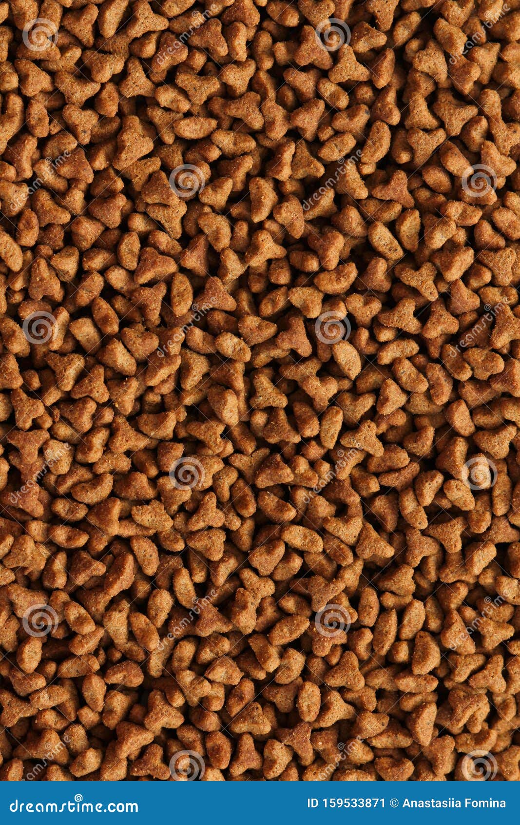 Dry Cat Food Texture Background. Medium Size Triangular Pieces. Food ...