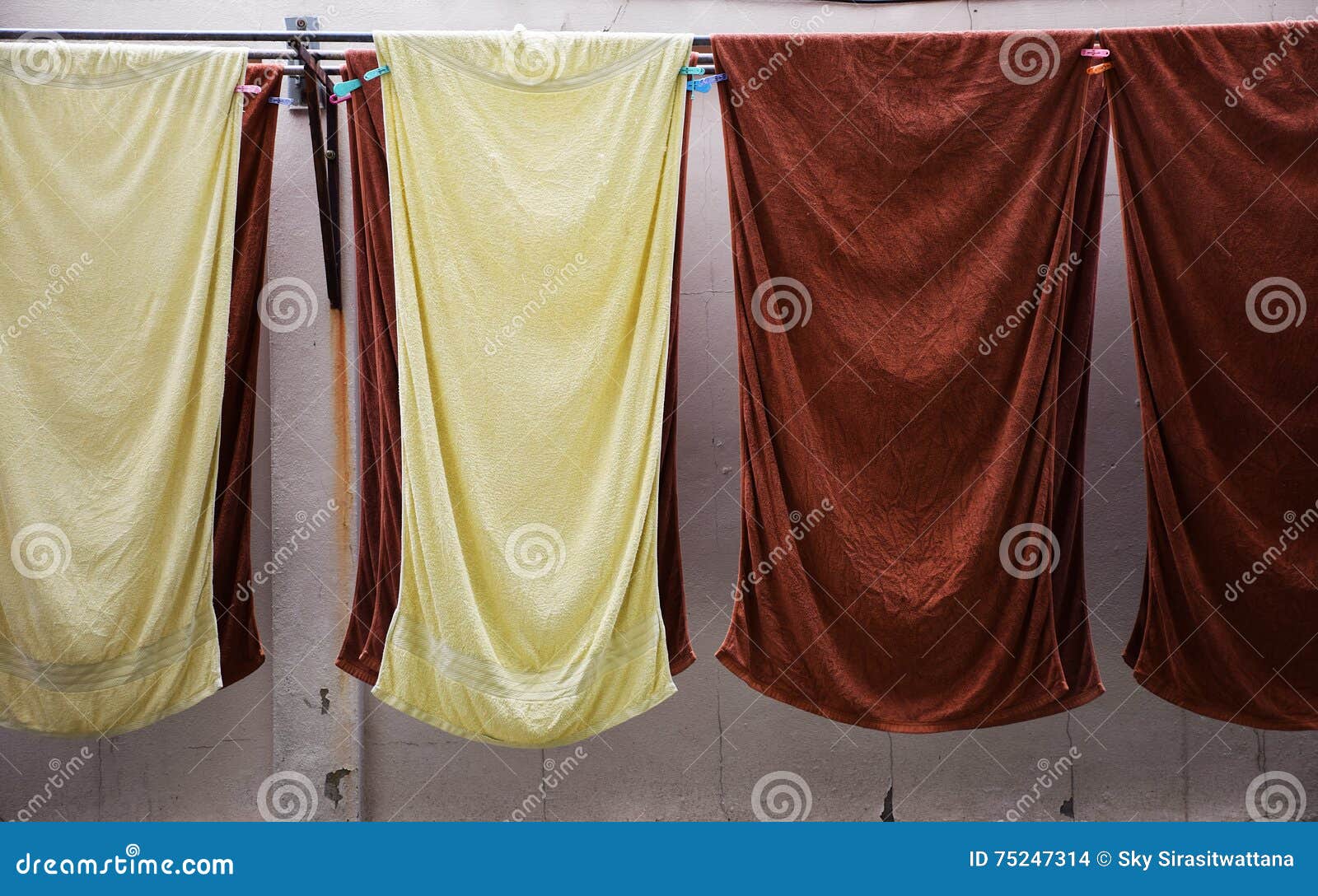 Dry clothes in the sun stock photo. Image of summer, shirt - 75247314