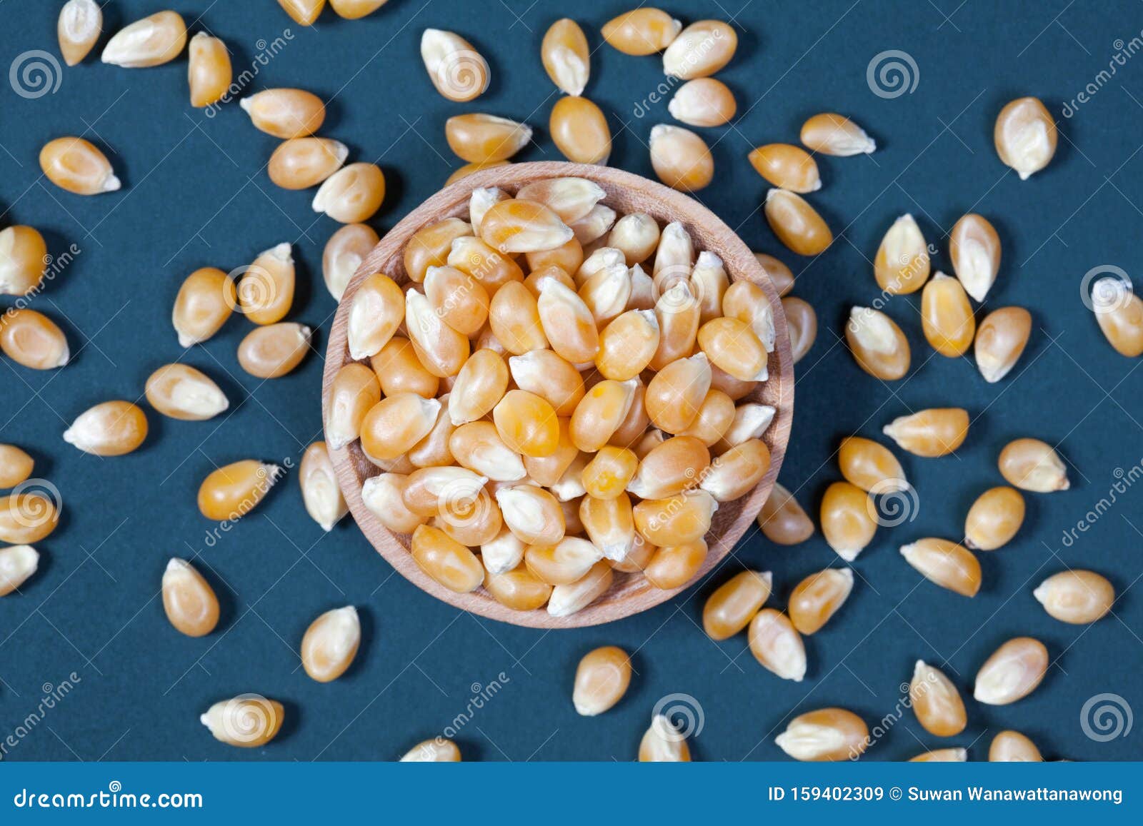The Dry Corn Kernels in a Wooden Bowl are Placed on a Green Board with ...