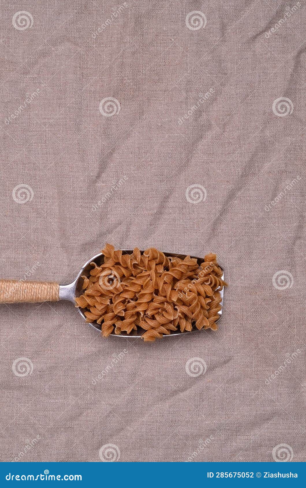 Dry dark brown pasta stock photo. Image of bowl, vegan - 285675052