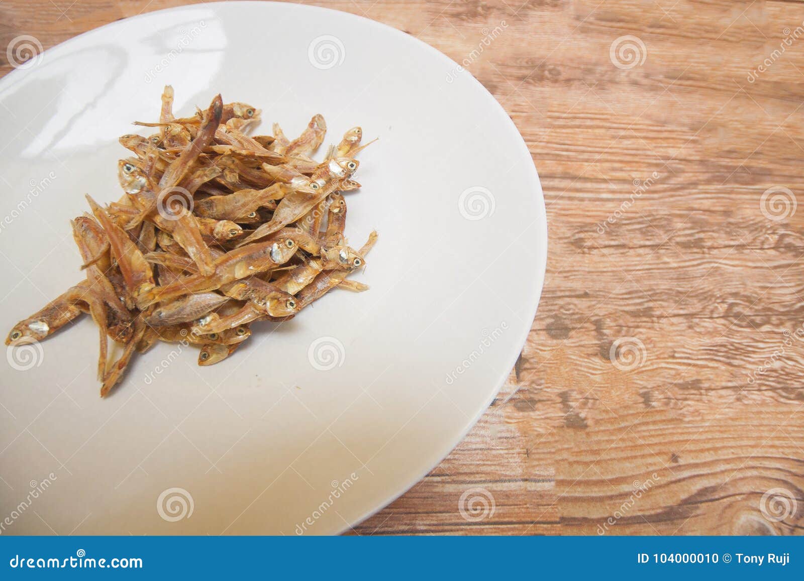 Dry fish on dish stock photo. Image of kitchen, board - 104000010