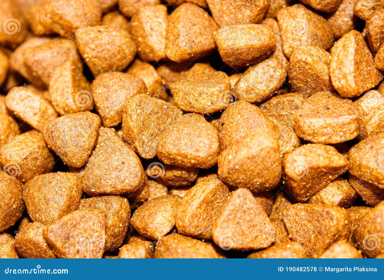 Dry Food Triangular Shape for Animals Close-up Stock Photo - Image of ...