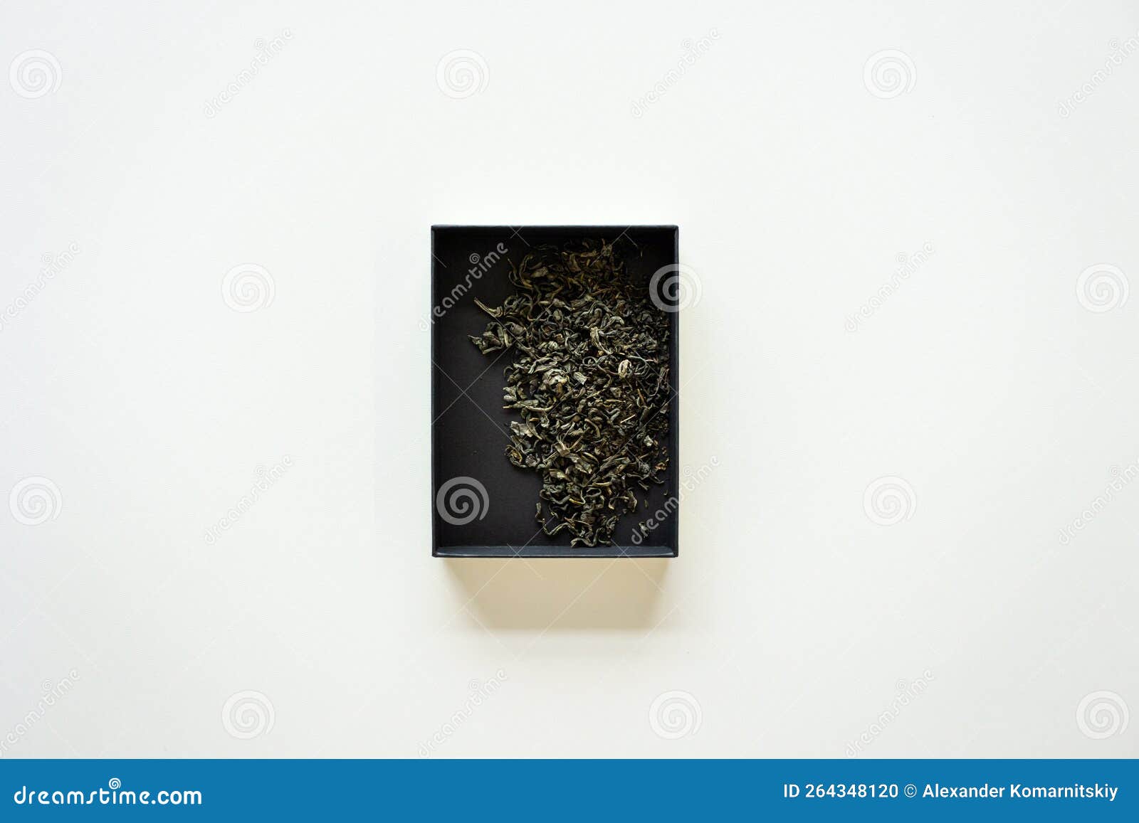 Dry Green Tea Leaves in a Box on a Light Background. Stock Photo ...