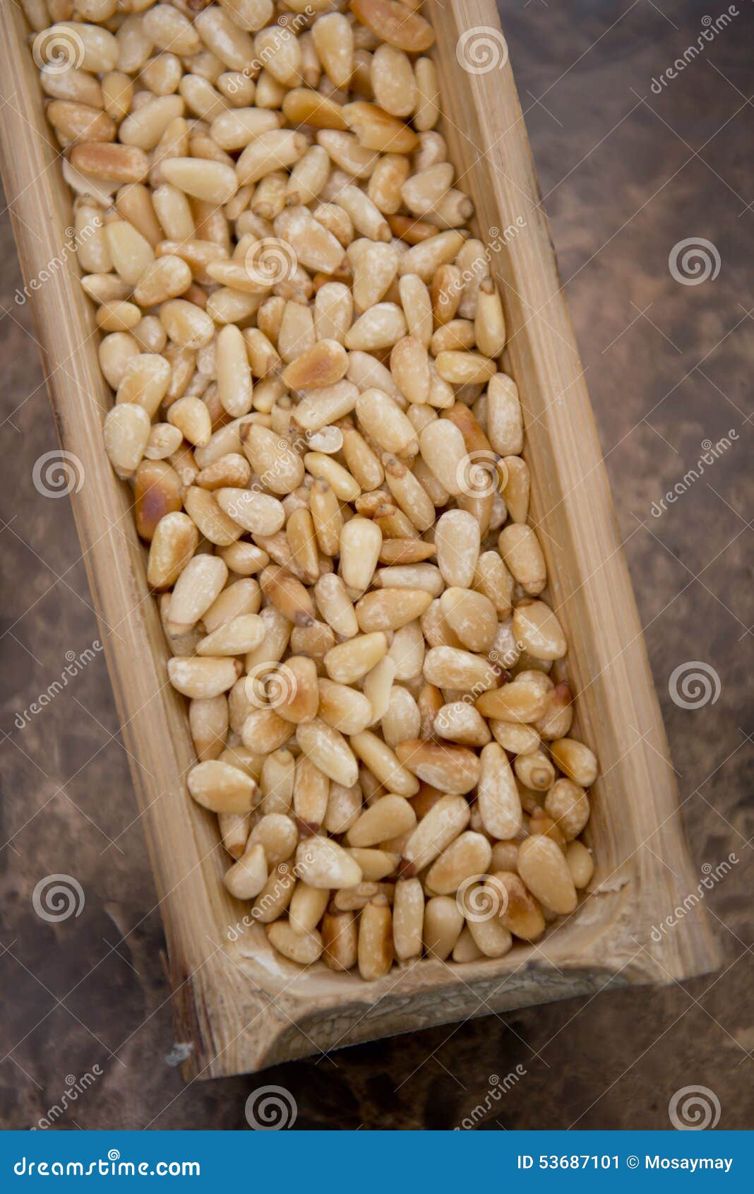 Dry nuts in bamboo tube stock image. Image of nature - 53687101