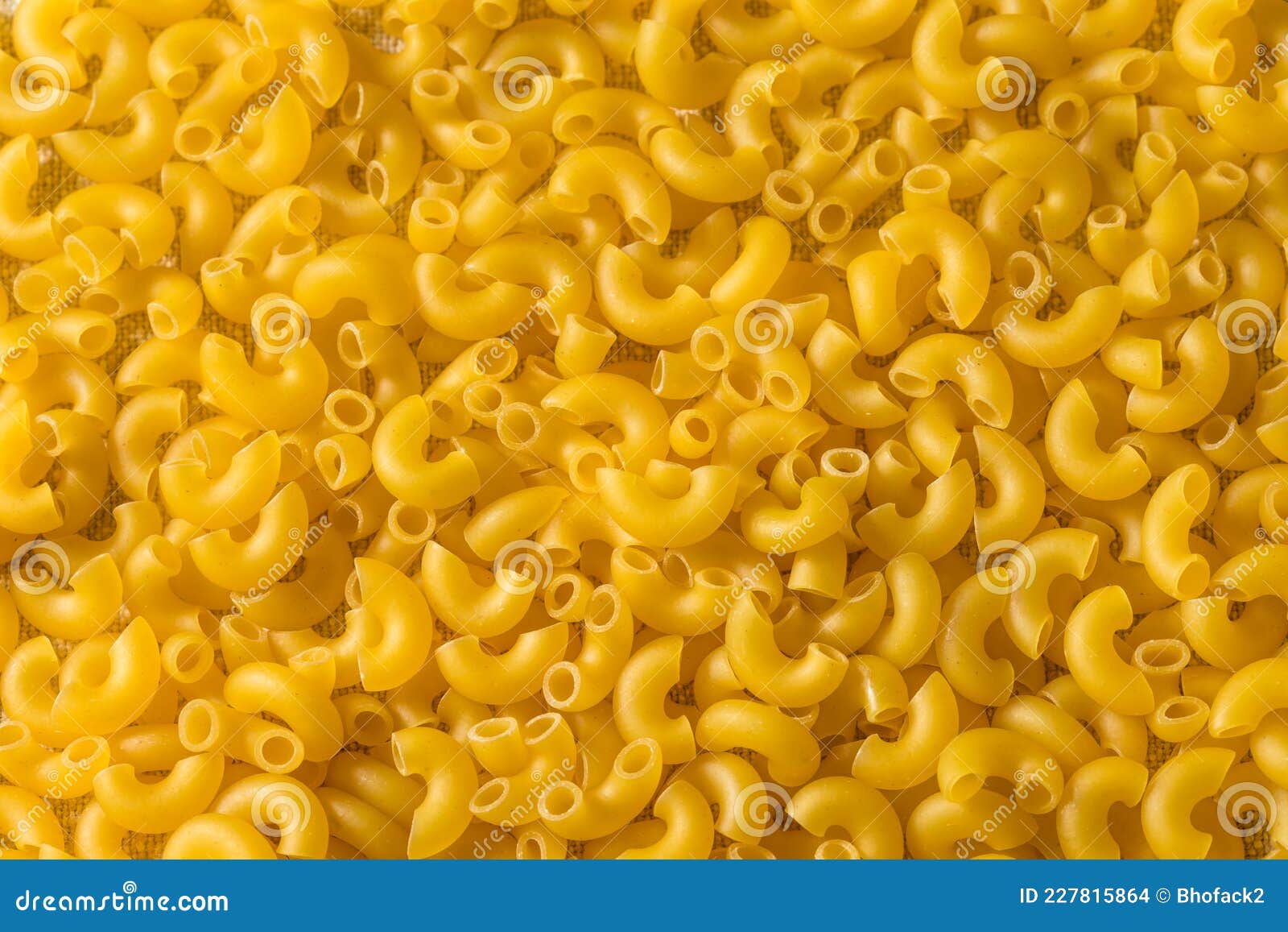 Dry Organic Macaroni Pasta stock photo. Image of traditional - 227815864