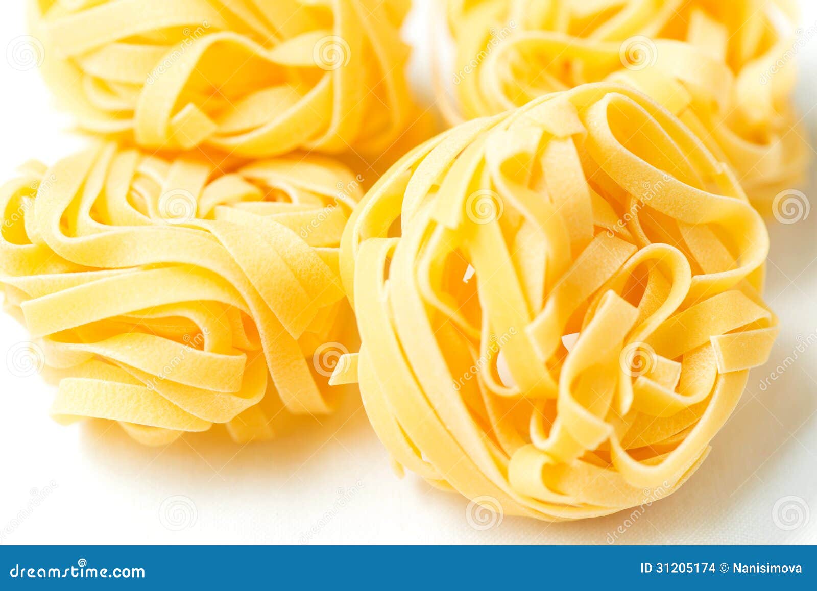 Dry Pasta Tagliatelle on Tablecloth Stock Photo - Image of kitchen ...