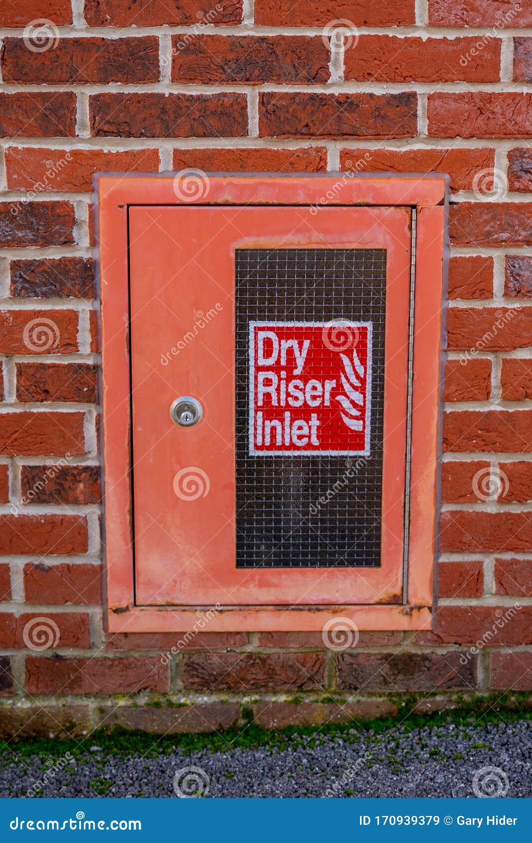 A Dry Riser Inlet Cupboard in a Brick Wall Stock Image - Image of ...