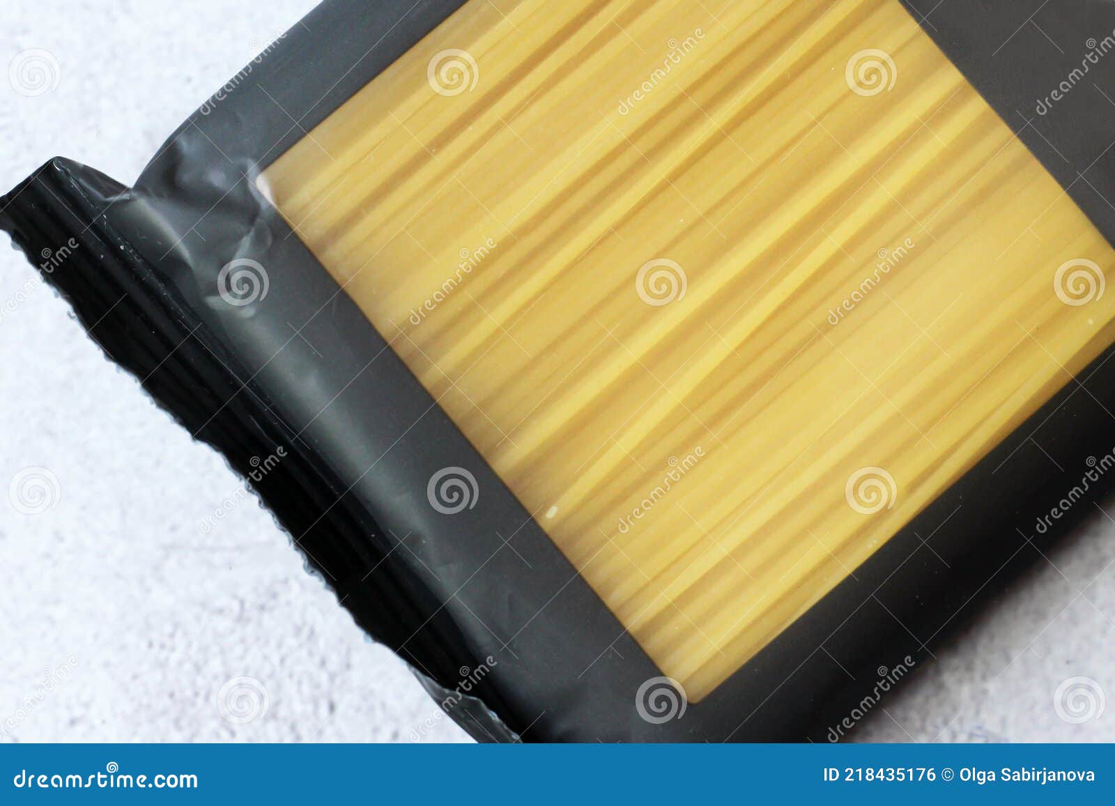 Dry spaghetti in a package stock photo. Image of food - 218435176