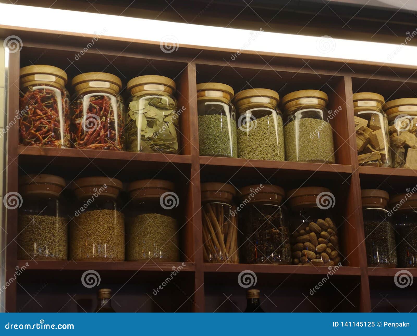Dry Stuff Packed in Clear Glass Bottles Wooden Shelf Stock Image ...