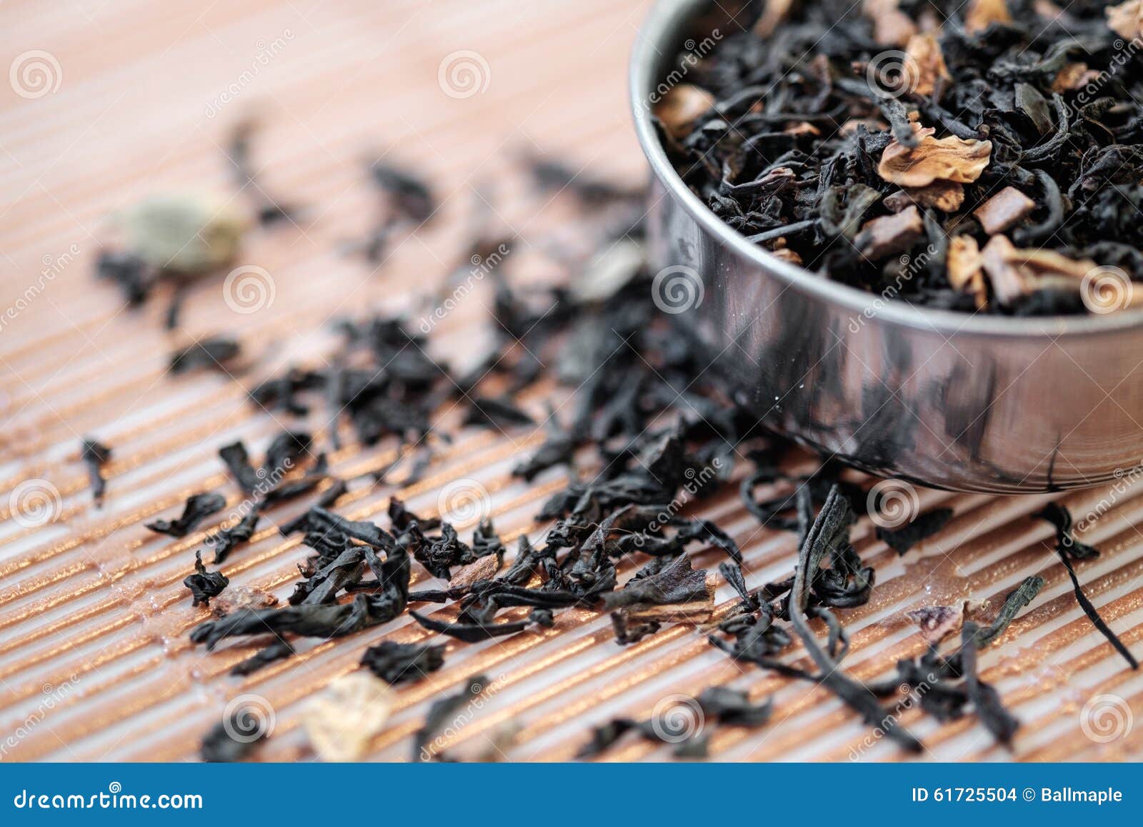 Dry Tea Leaves Spread on Light Brown Color Background Stock Photo ...