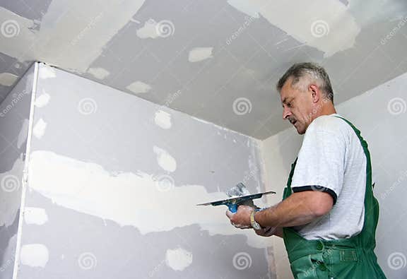 Dry waller at work stock photo. Image of drywall, hall - 5623116