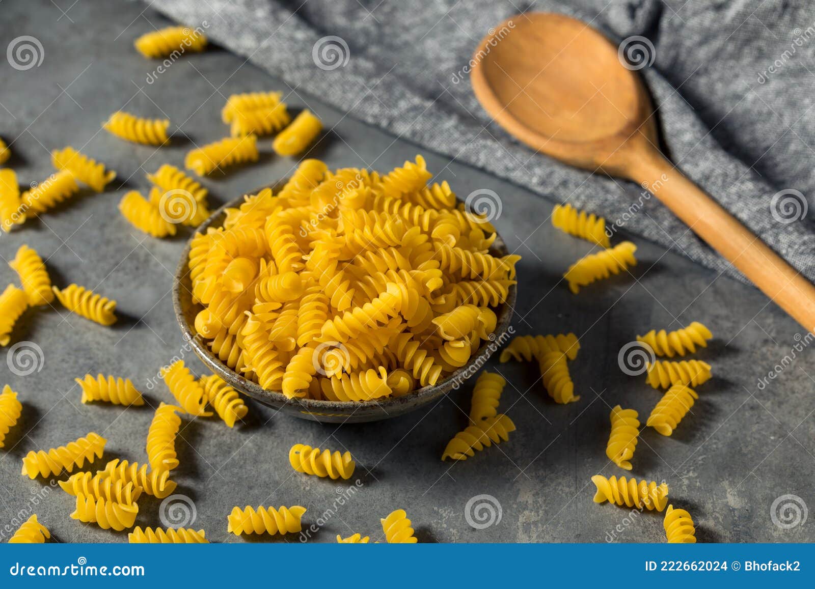 Dry Yellow Organic Rotini Pasta Stock Photo - Image of meal, healthy ...