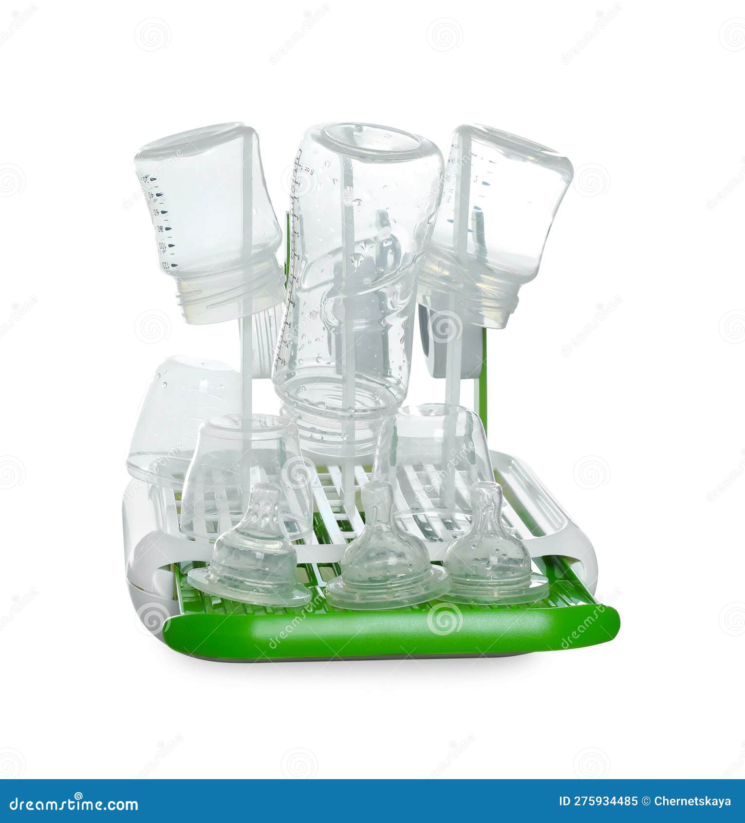 Dryer with Baby Bottles and Nipples after Sterilization on Light Grey ...