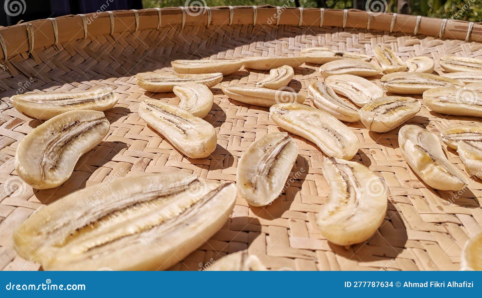 Drying the banana slices stock photo. Image of background - 277787634