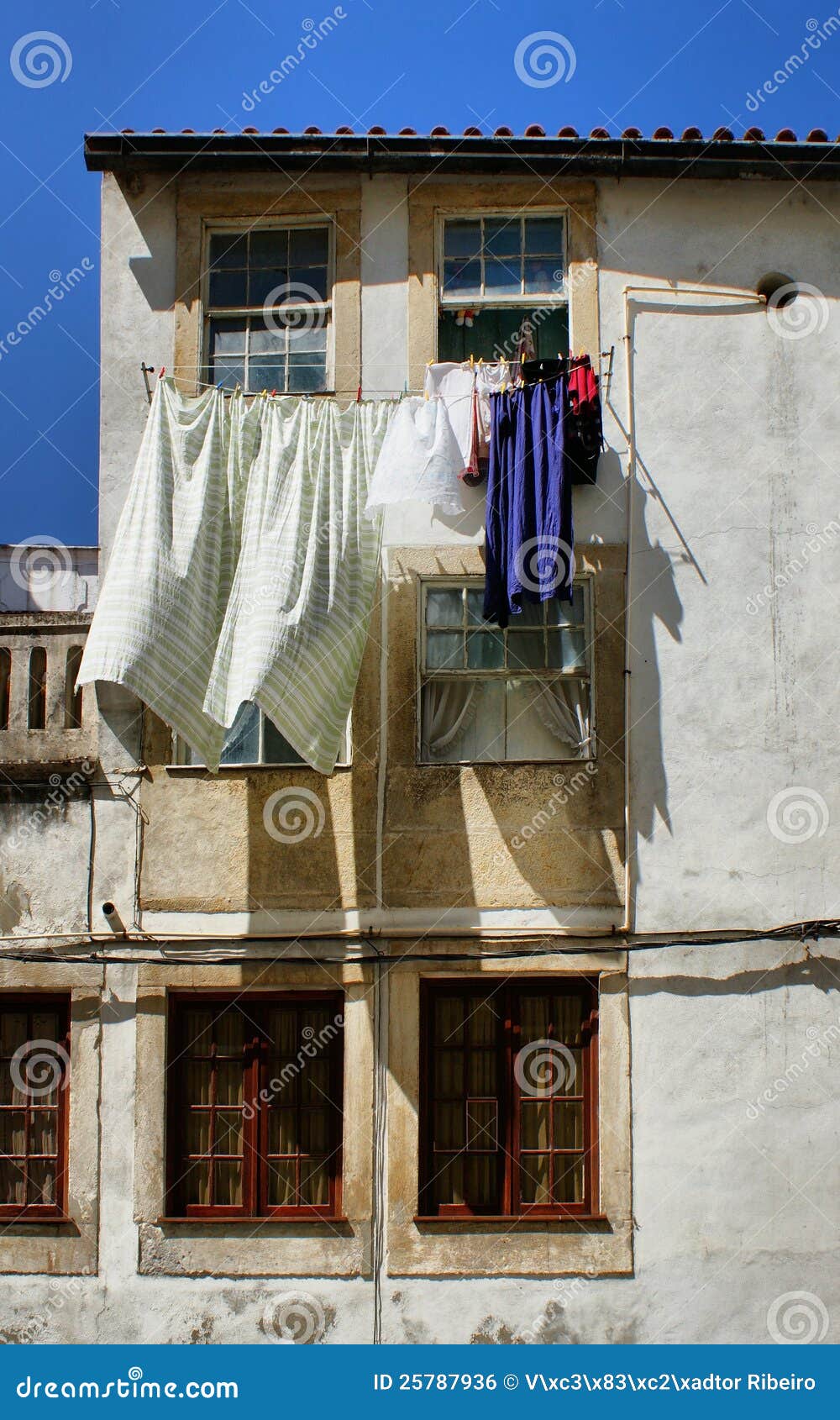 Drying Clothes On A Rope On Windows And Balconies Royalty-Free Stock ...