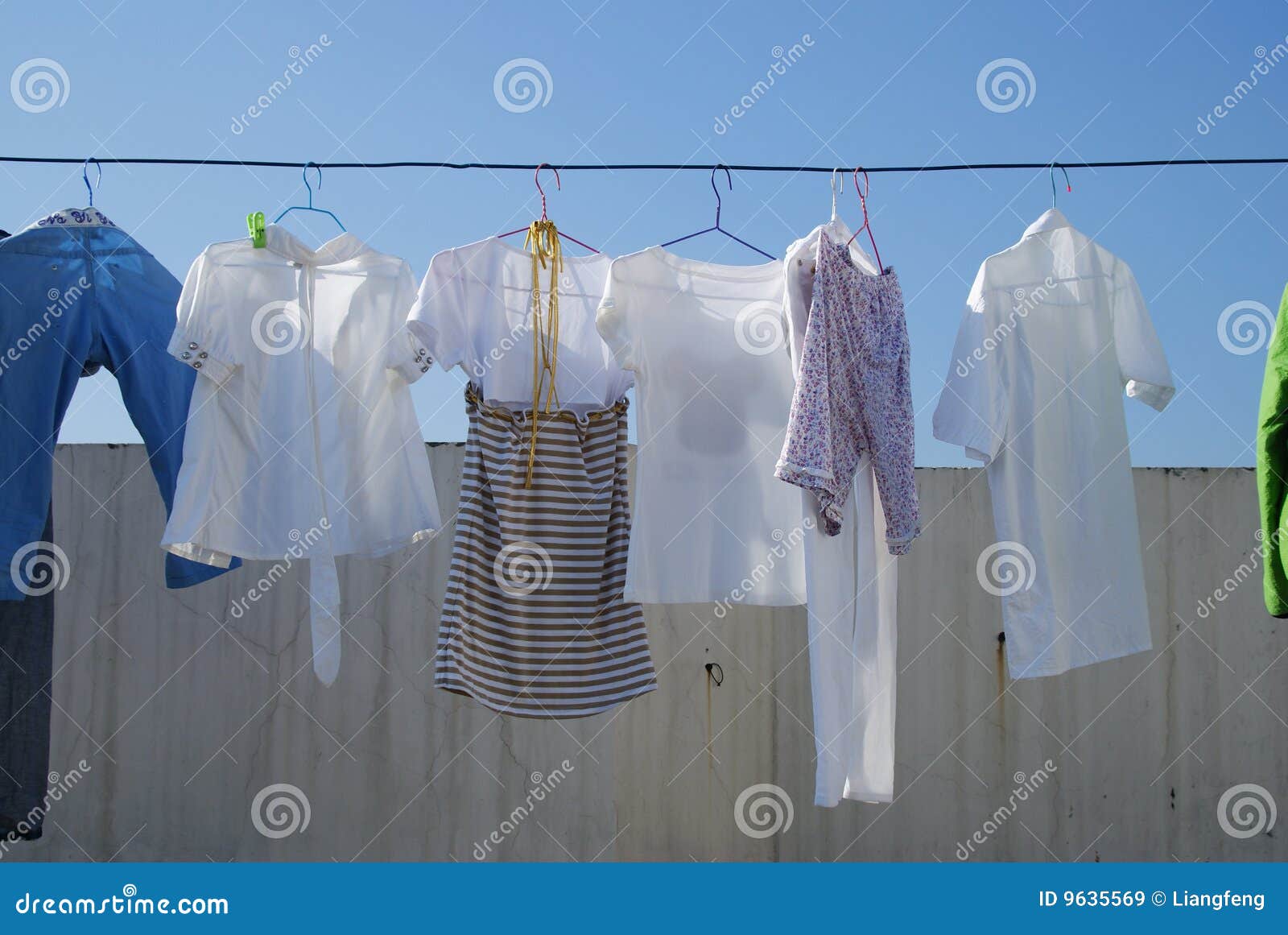 Drying clothes stock image. Image of windy, shirt, green - 9635569