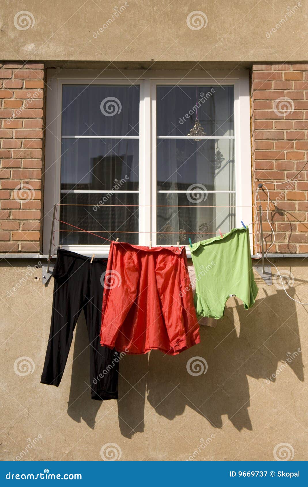 Drying Clothes On A Rope On Windows And Balconies Royalty-Free Stock ...