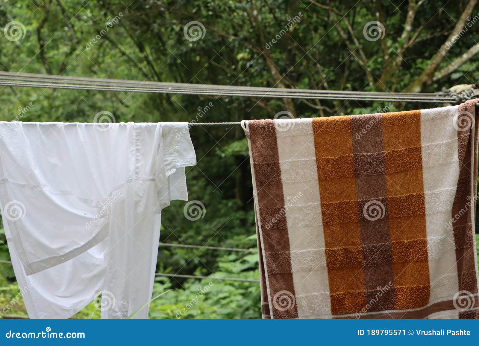 Drying Clothes on Line in Backyard Stock Image - Image of clothespin ...