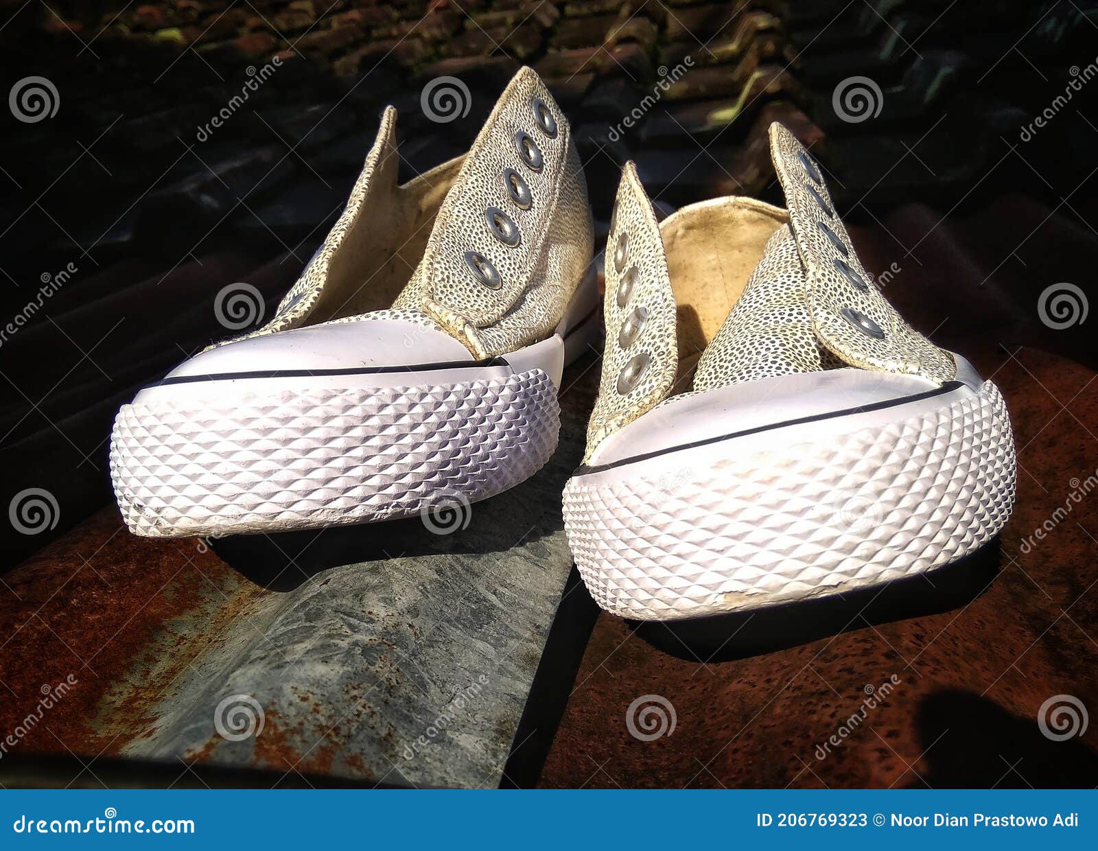 Drying damp shoes stock image. Image of yellow, textile - 206769323