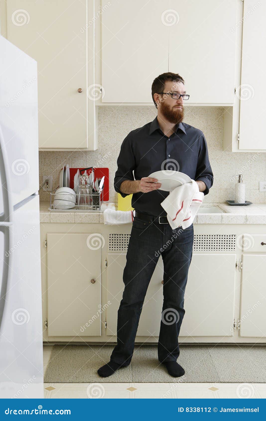 Drying Dishes stock photo. Image of adult, length, full - 8338112