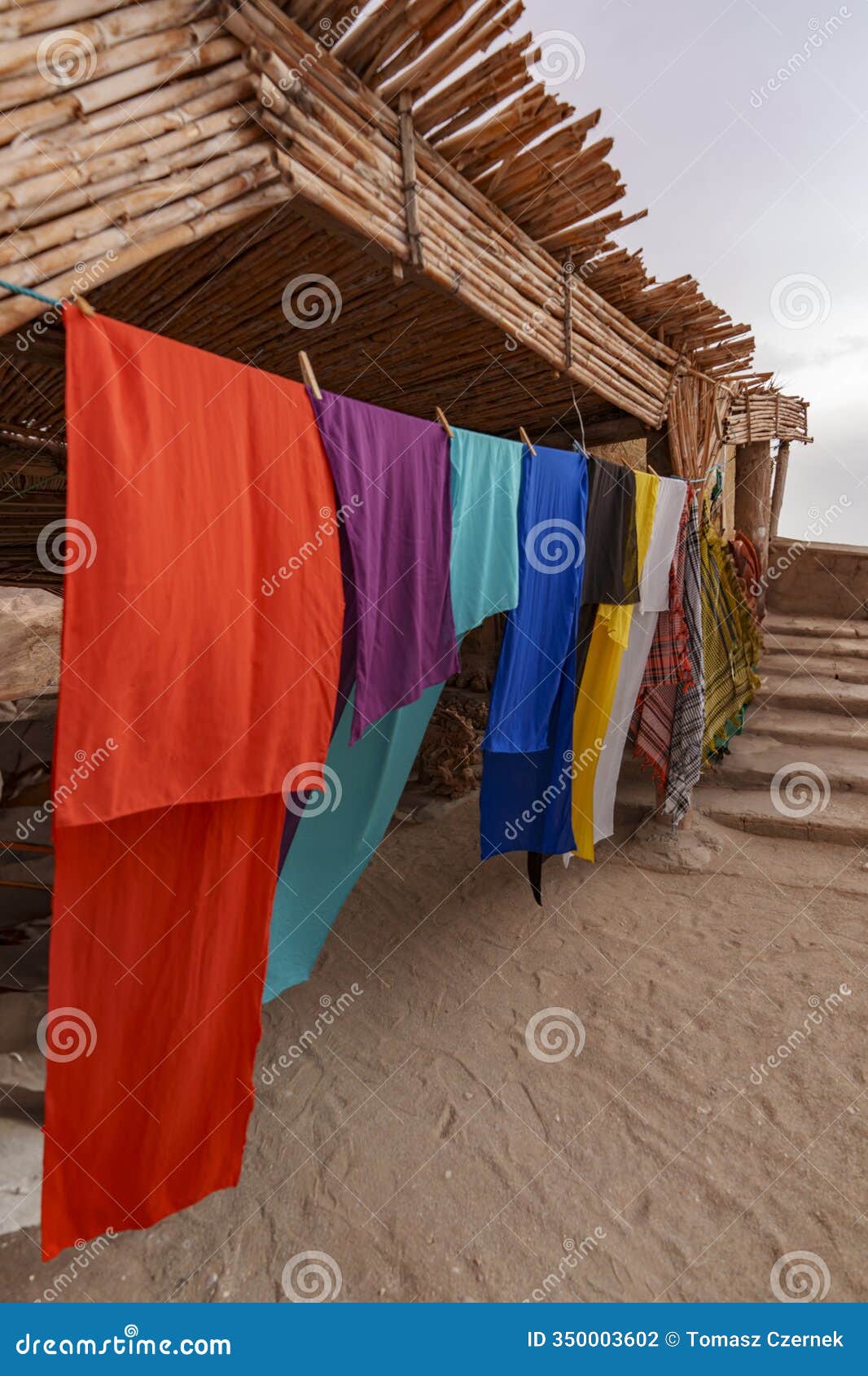 Drying, Hanging Colored Materials in a Desert Environment Stock Photo ...