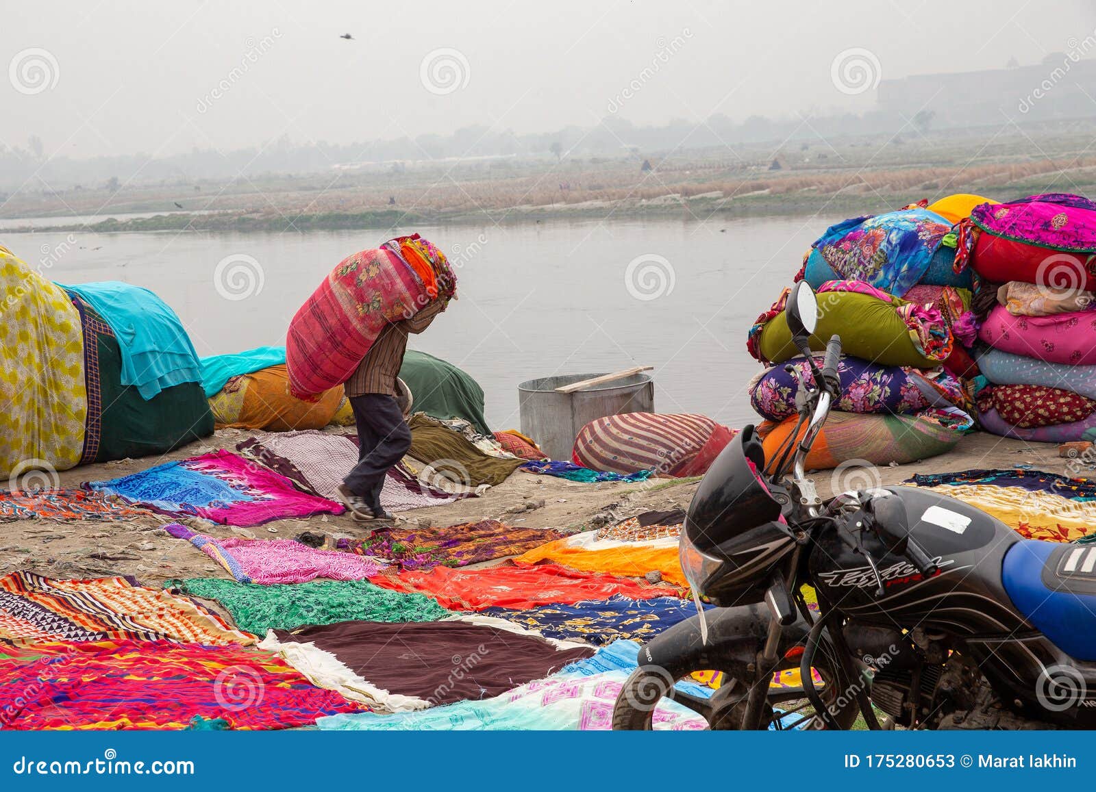 Drying Laundry on the Ground and a Walking Worker Editorial Stock Photo ...
