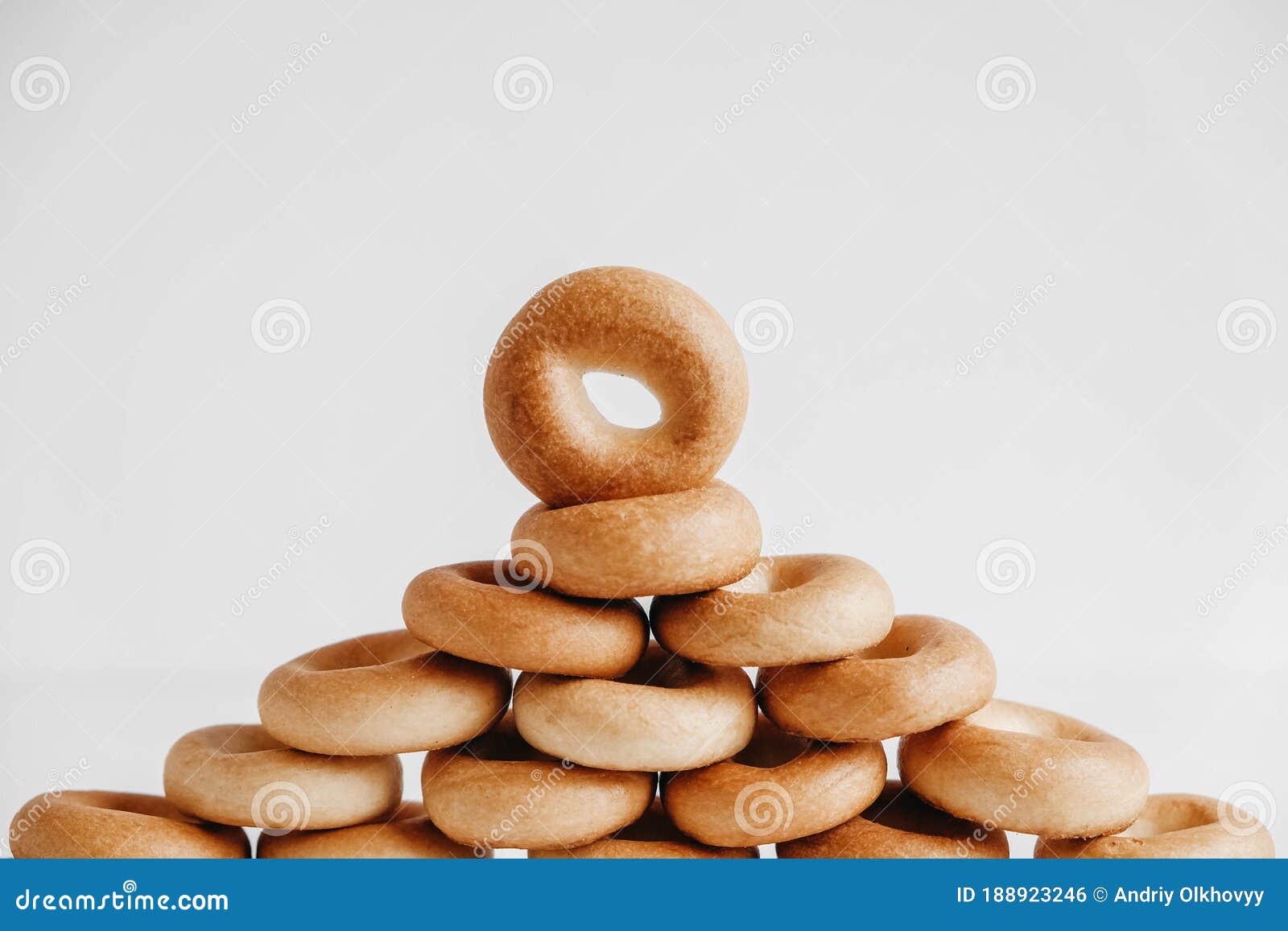 Drying or Mini Round Bagels in the Shape of a Pyramid on a White Wooden ...