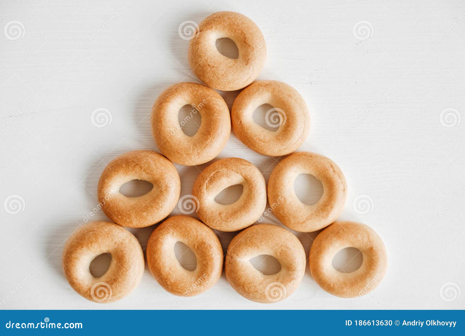 Drying or Mini Round Bagels in the Shape of a Pyramid on a White Wooden ...