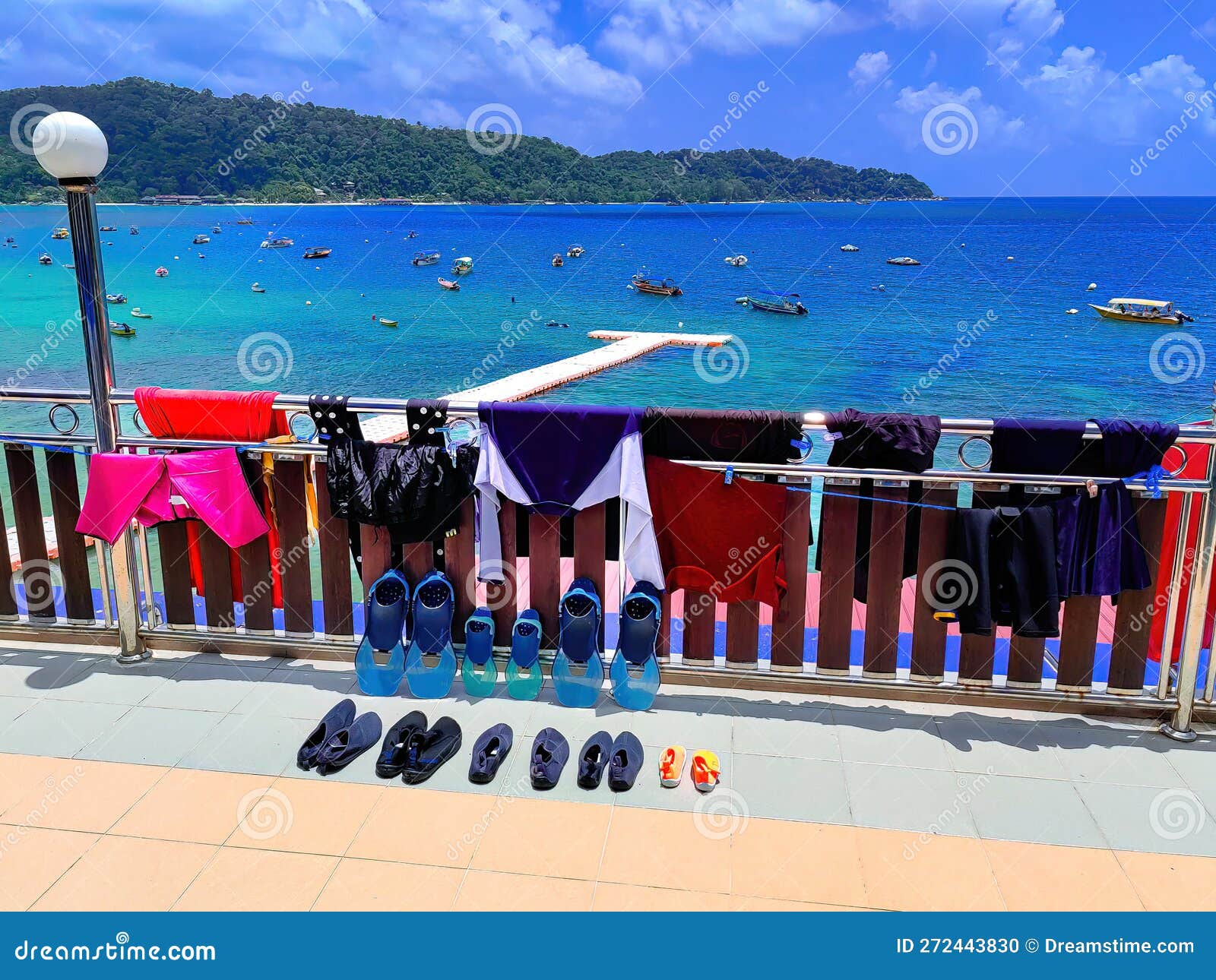 Drying Swimming Clothes on the Rail at the Beach Stock Photo - Image of ...