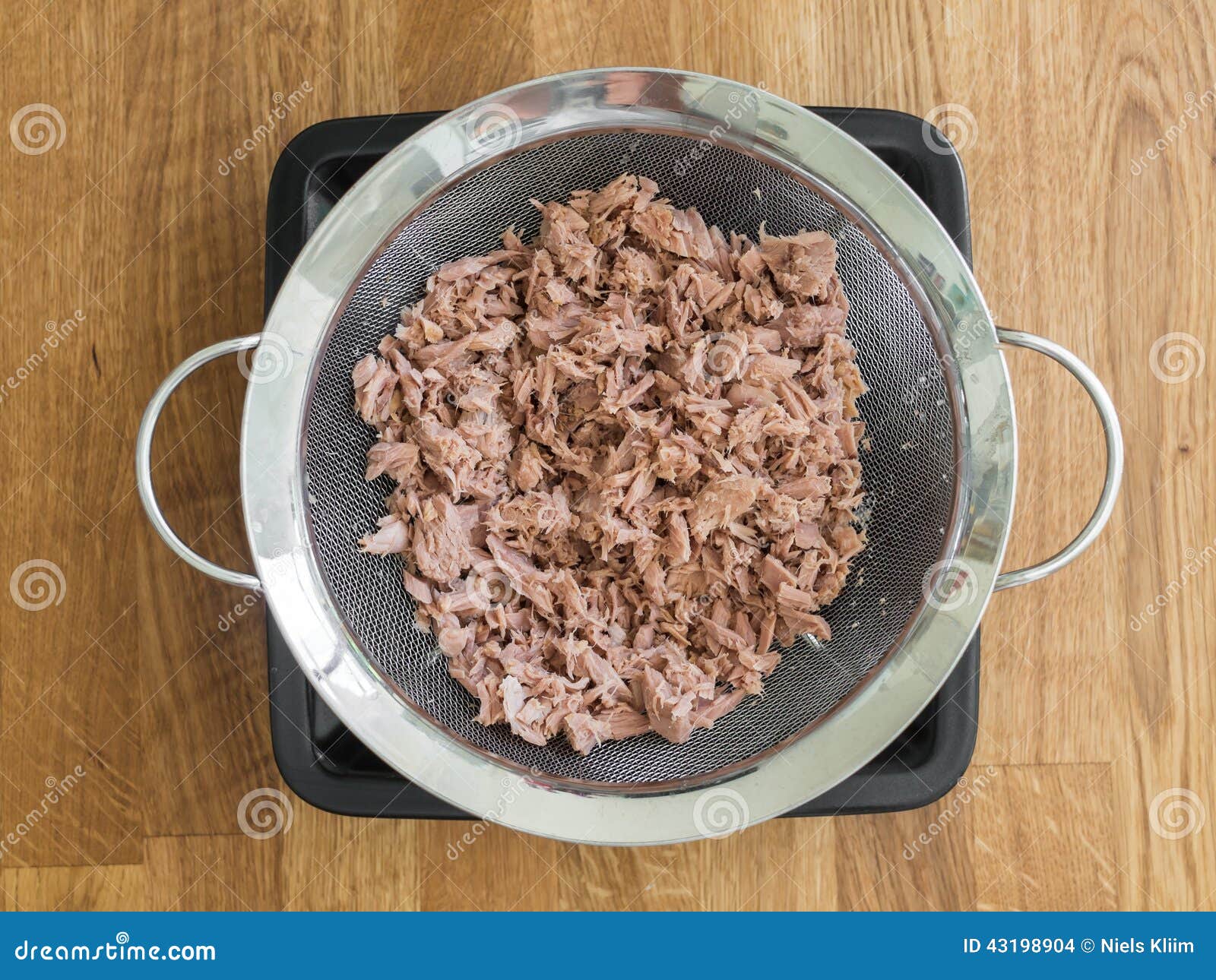 Drying the Tuna Fish in a Colander Stock Photo - Image of fish, snack ...