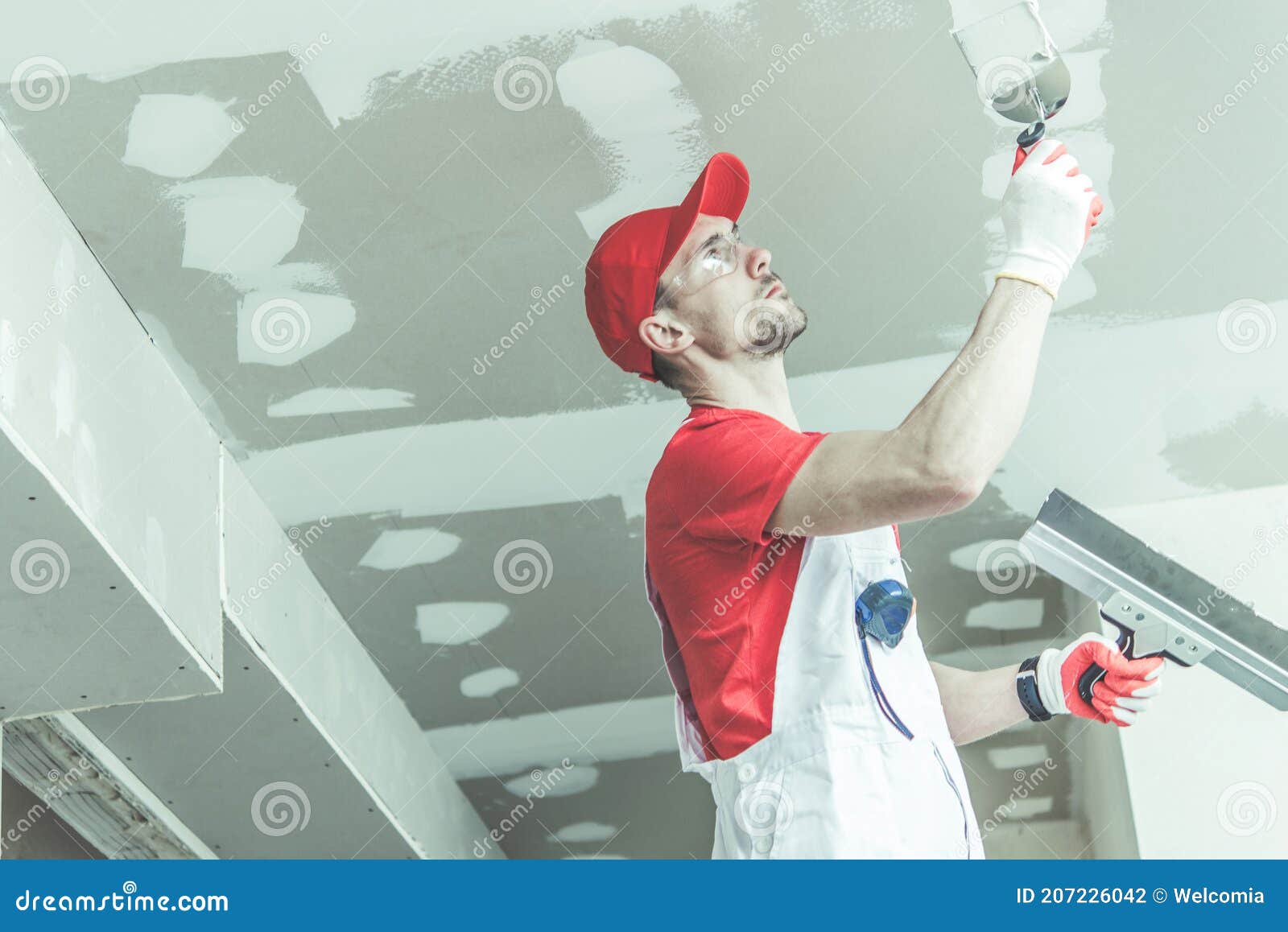 Drywall Ceiling Patching by Remodeling Worker Stock Photo - Image of ...