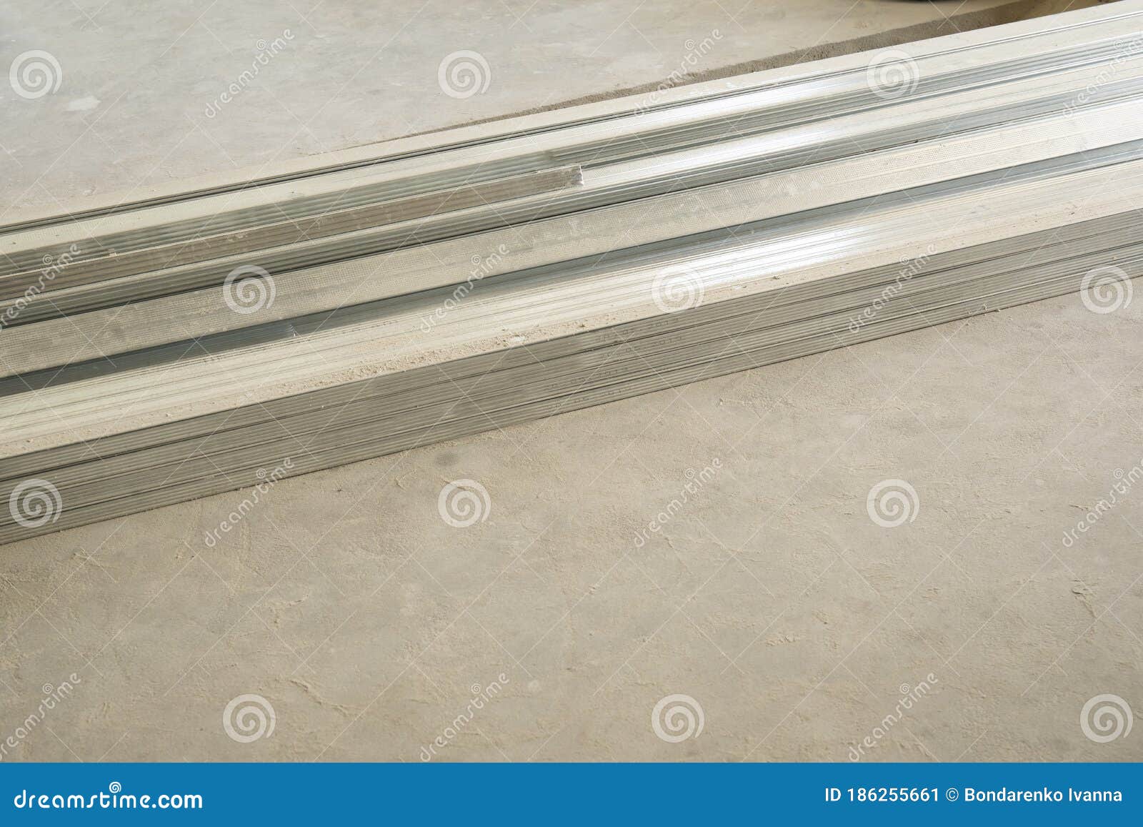 Drywall Metallic Profile on Grey Concrete Floor Stock Image - Image of ...
